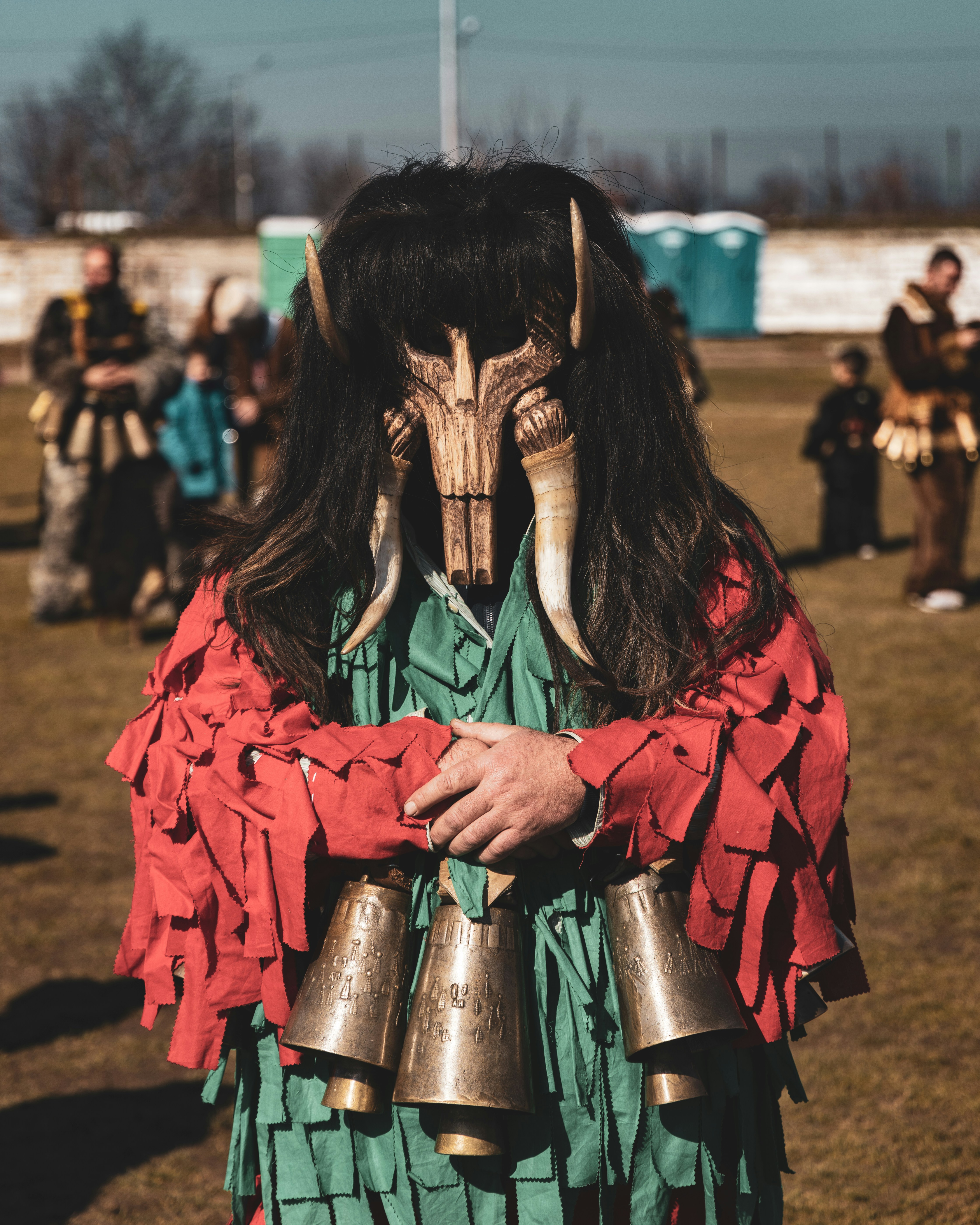 A person in a costume with horns and bells photo – Free Culture Image ...
