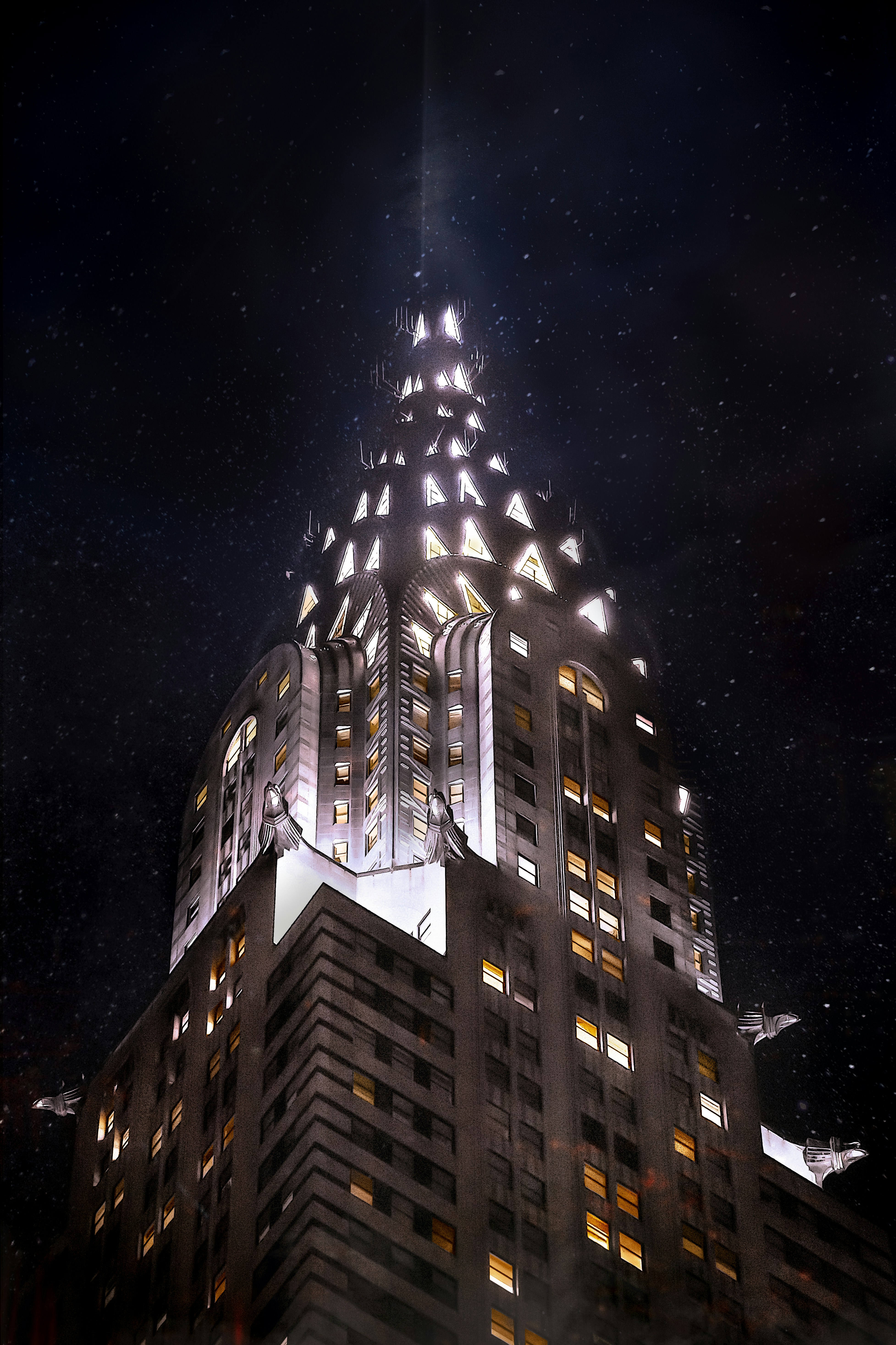 A very tall building lit up at night photo – Free New york Image on ...