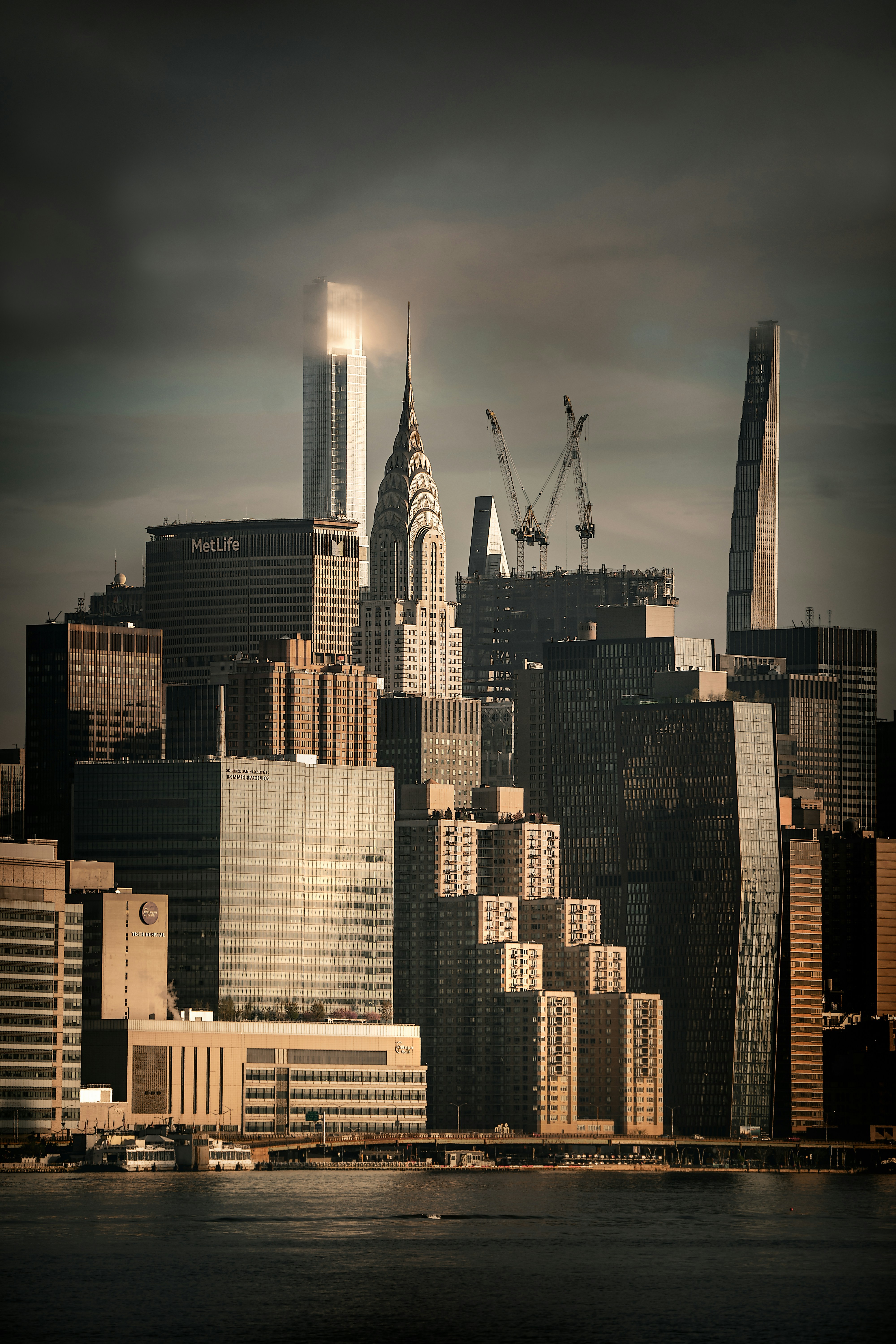 A view of a large city with tall buildings photo – Free New york Image ...