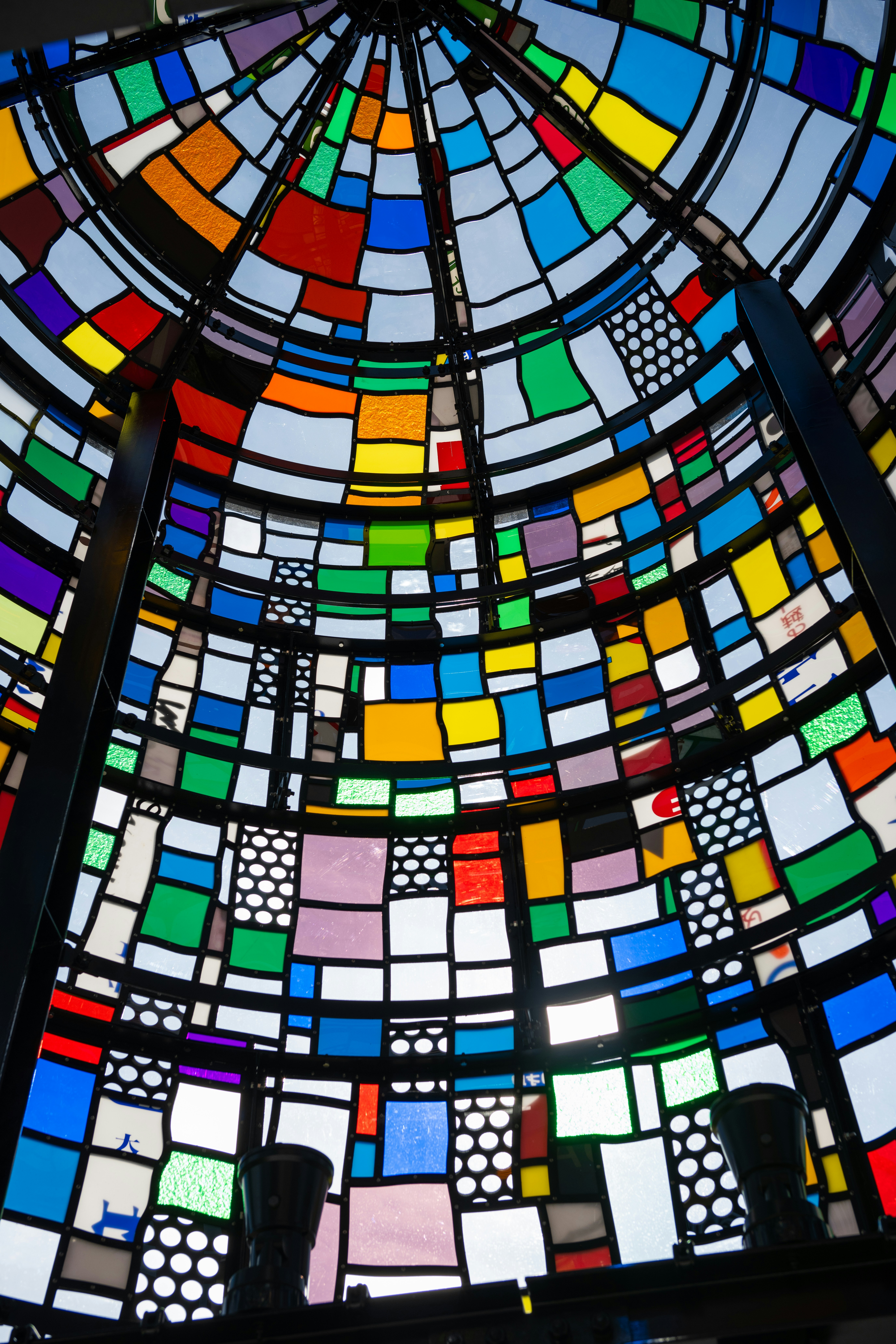A colorful stained glass window in a building photo – Free Art Image on ...