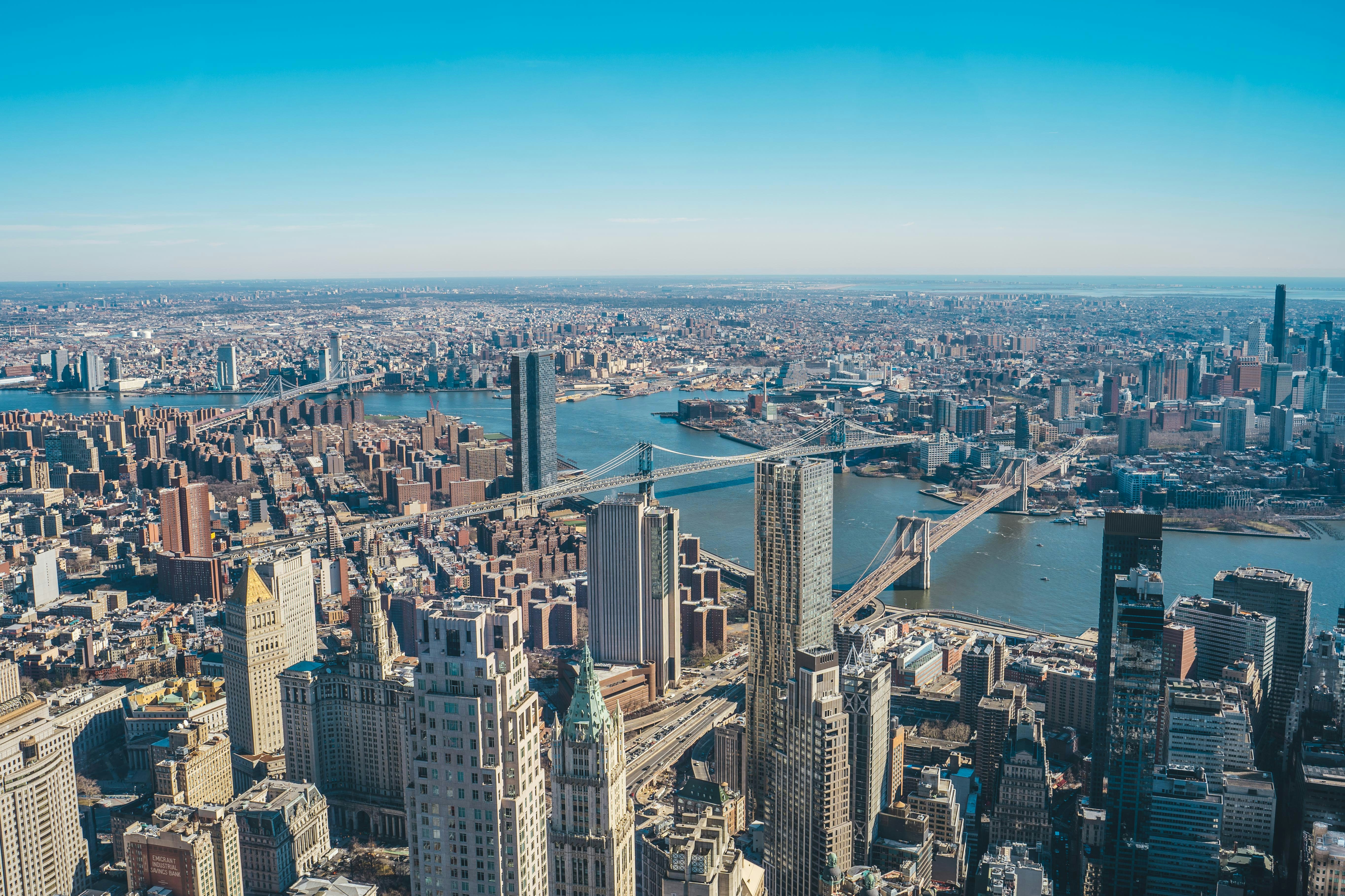 An aerial view of a city with tall buildings photo – Free New york ...