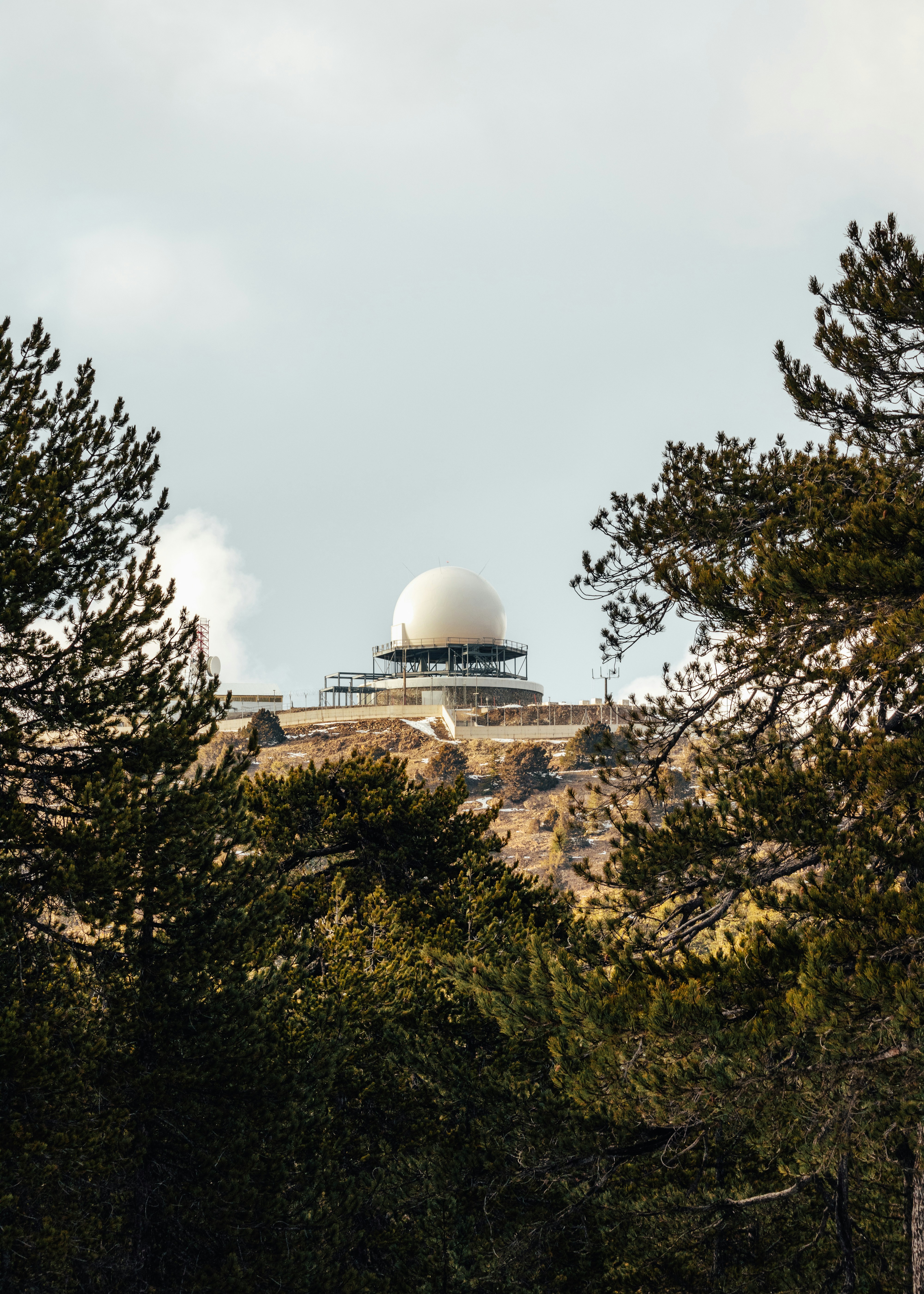 A telescope on top of a hill surrounded by trees photo – Free Troodos ...