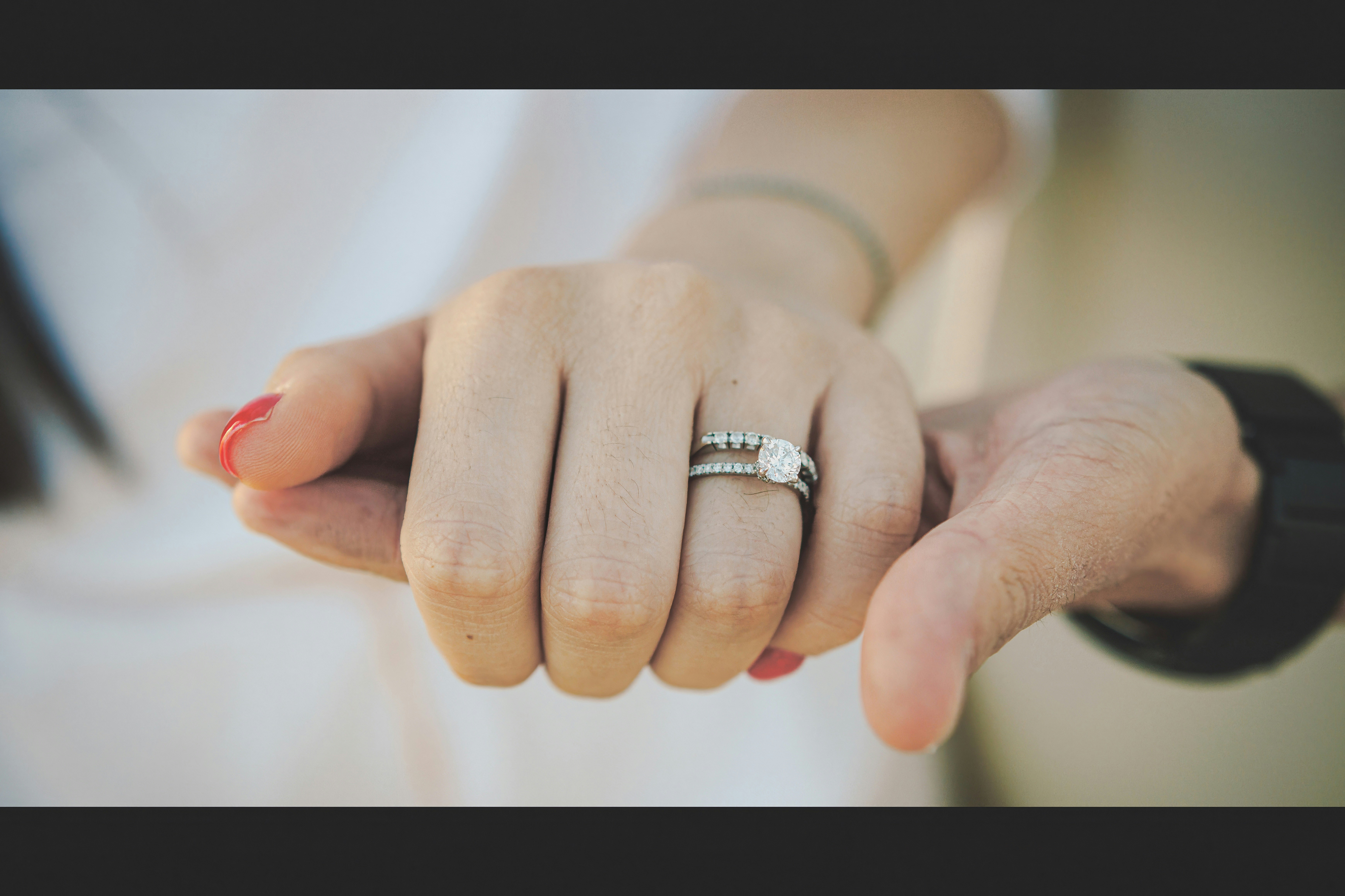 A close up of a person holding the hand of another person photo – Free ...