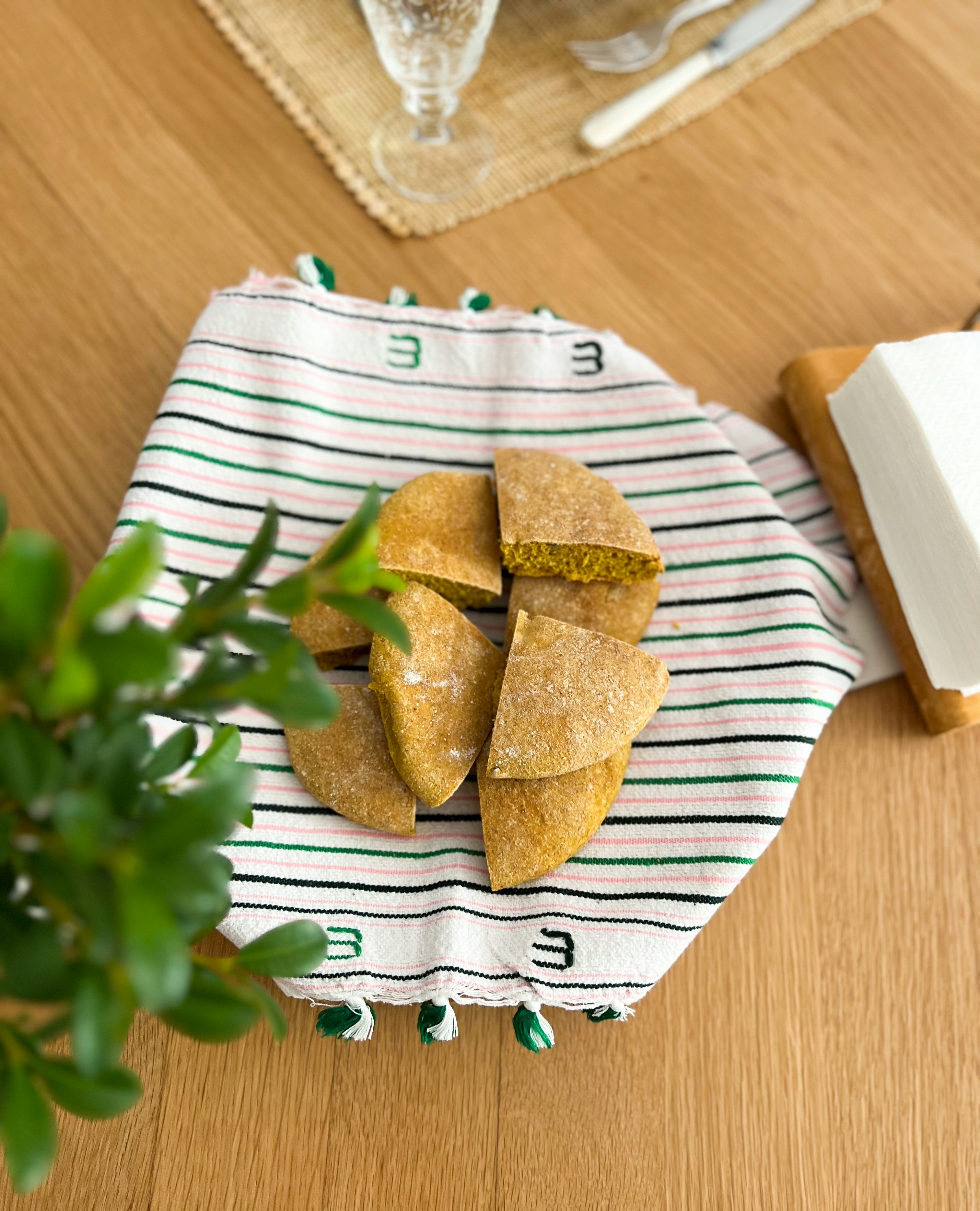 Golden Slices on a Striped Cloth: Rustic Snack Quartet