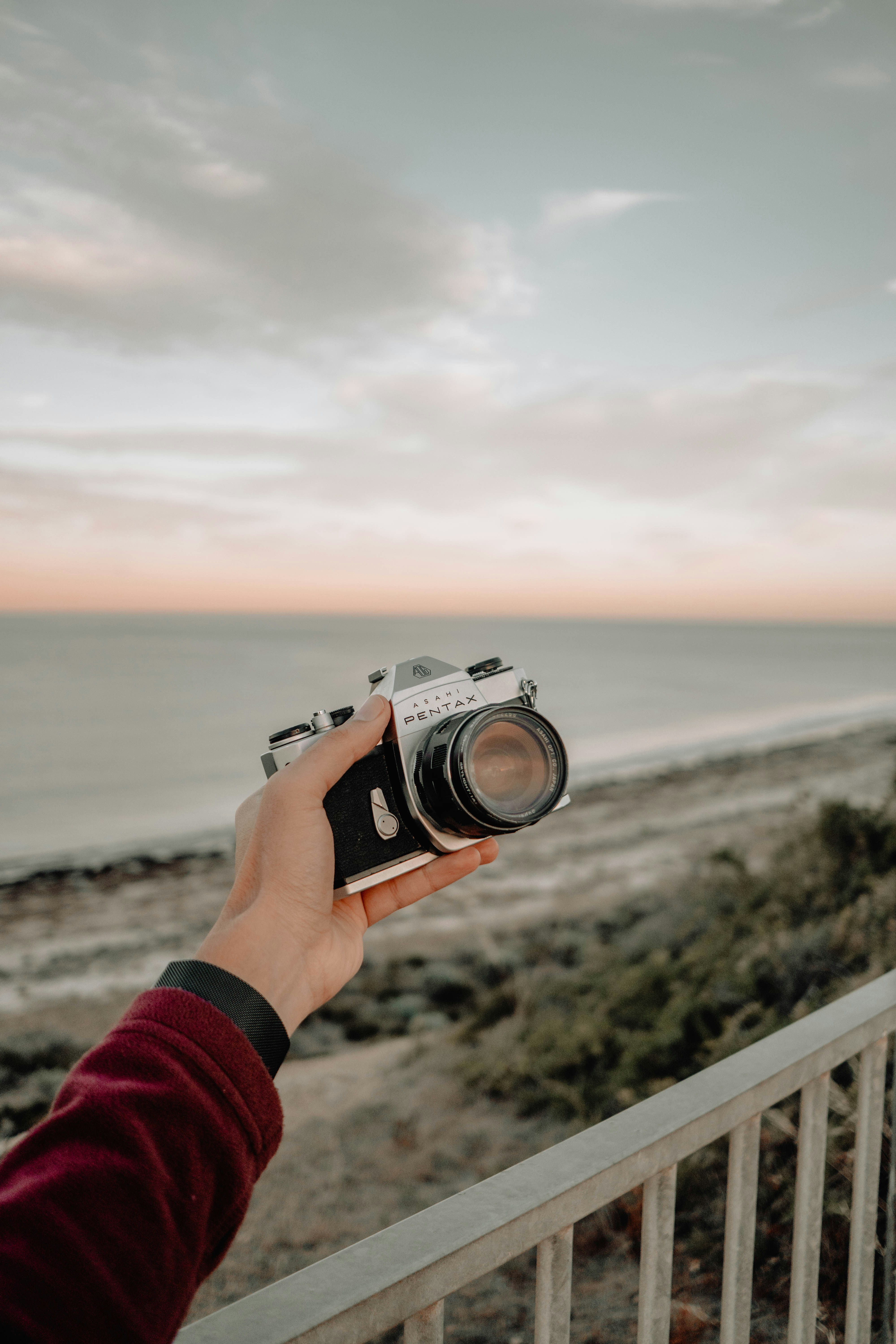 Coastal Quiet: A Hand-Held Vintage Pentax at Sunset
