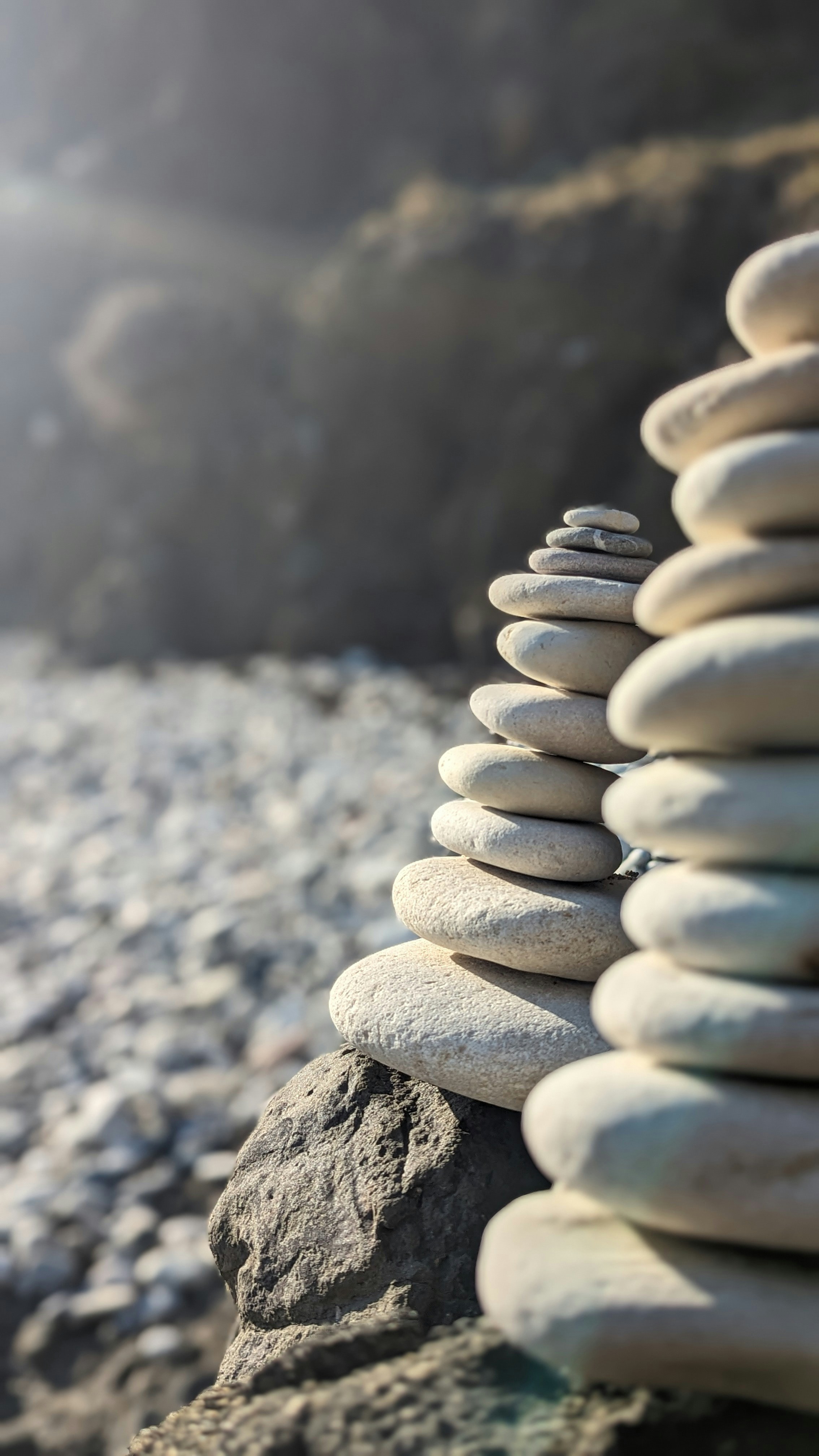 A stack of rocks sitting on top of a beach photo – Free Cyprus Image on ...