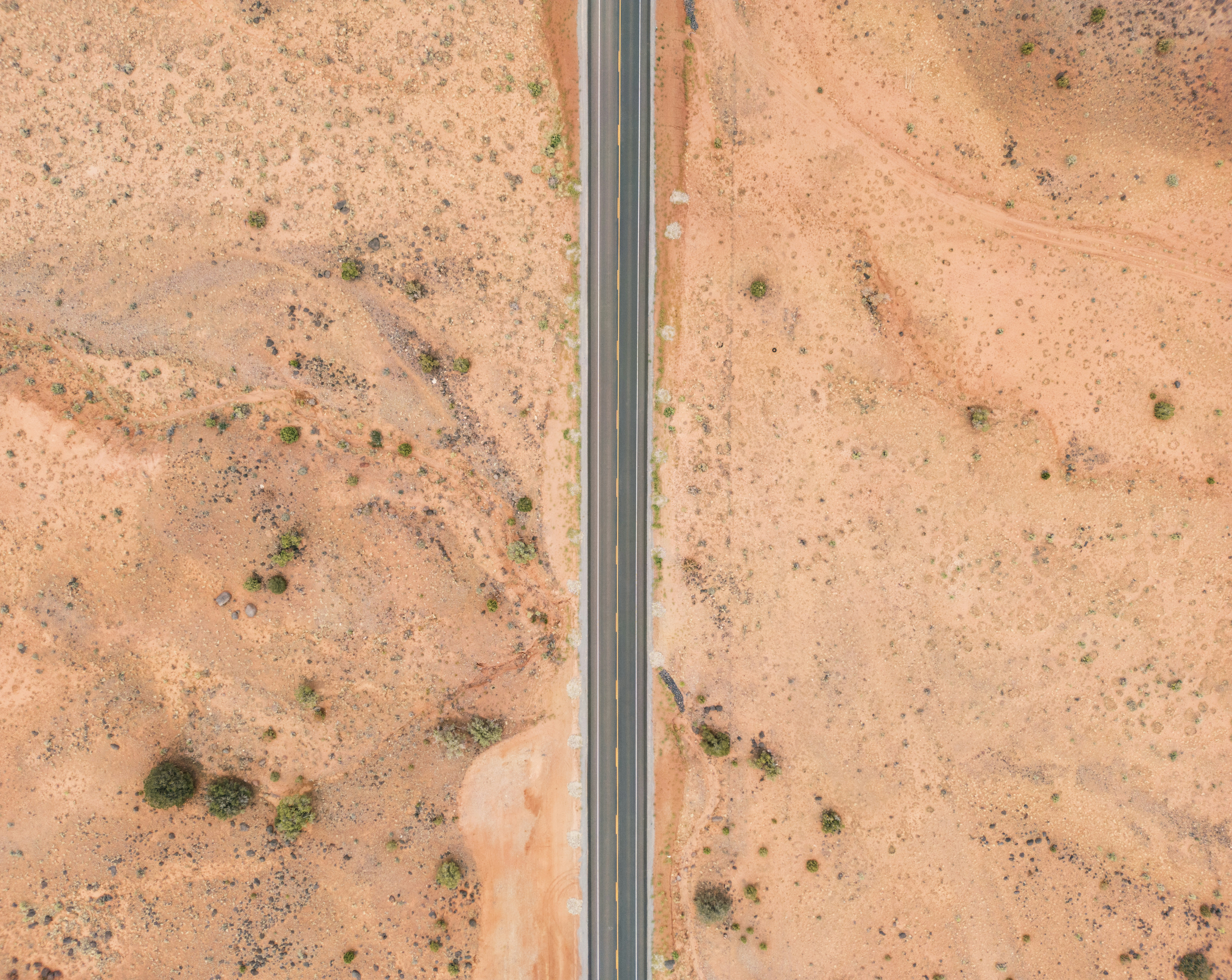 An aerial view of two roads in the desert photo – Free Capitol reef ...