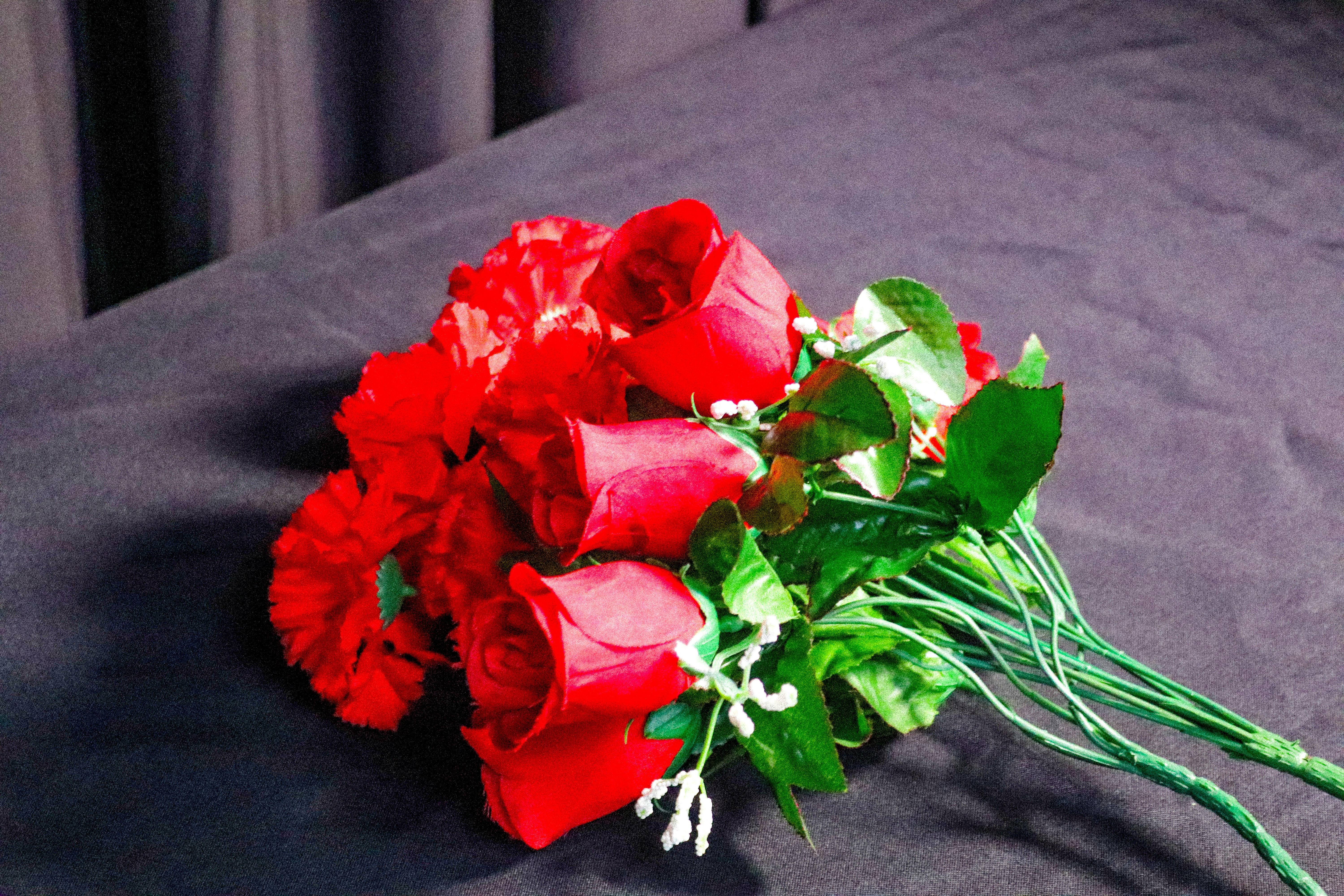 Bouquet on Velvet: A Dramatic Red Still?