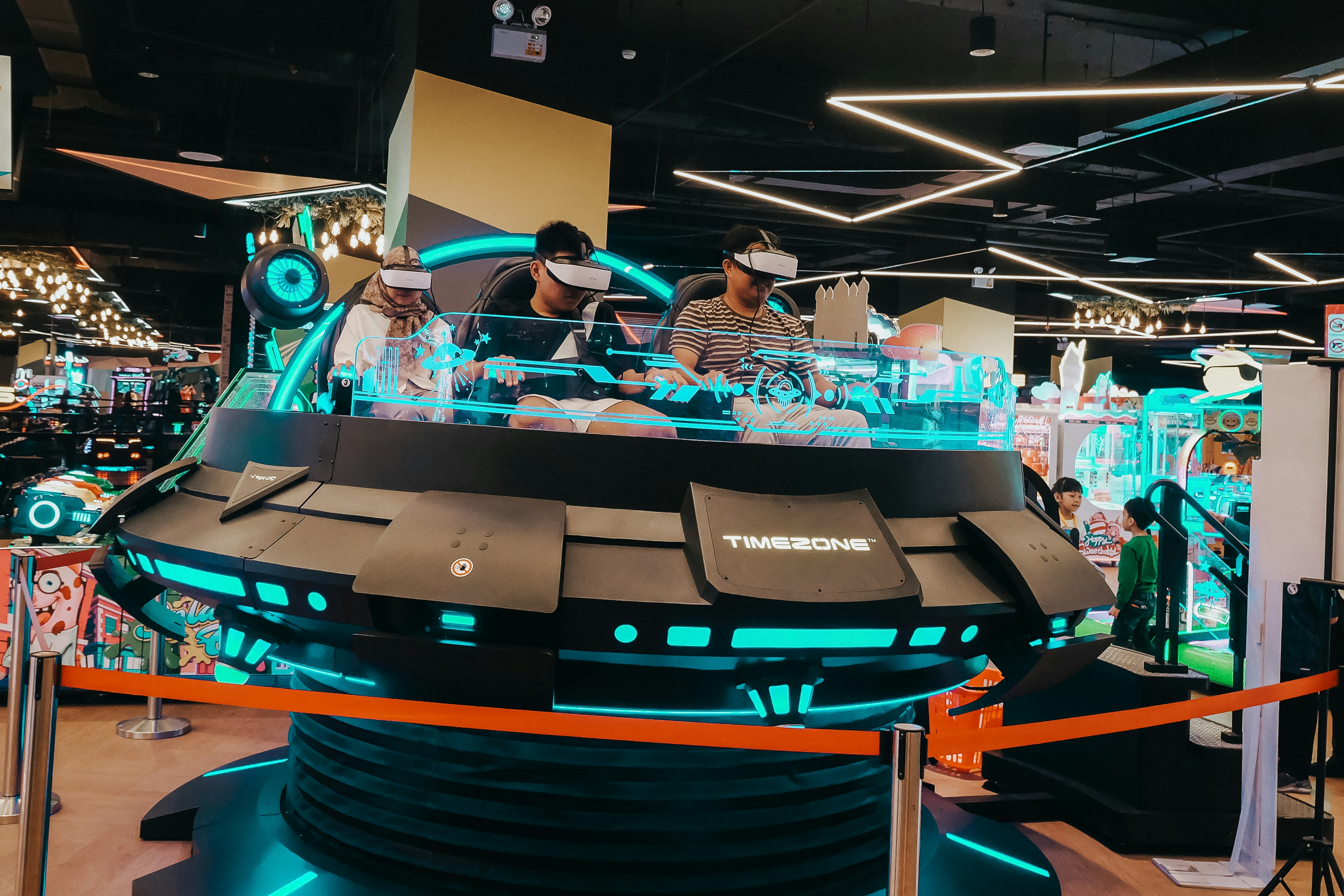 Kids playing UFO simulation using virtual reality headset