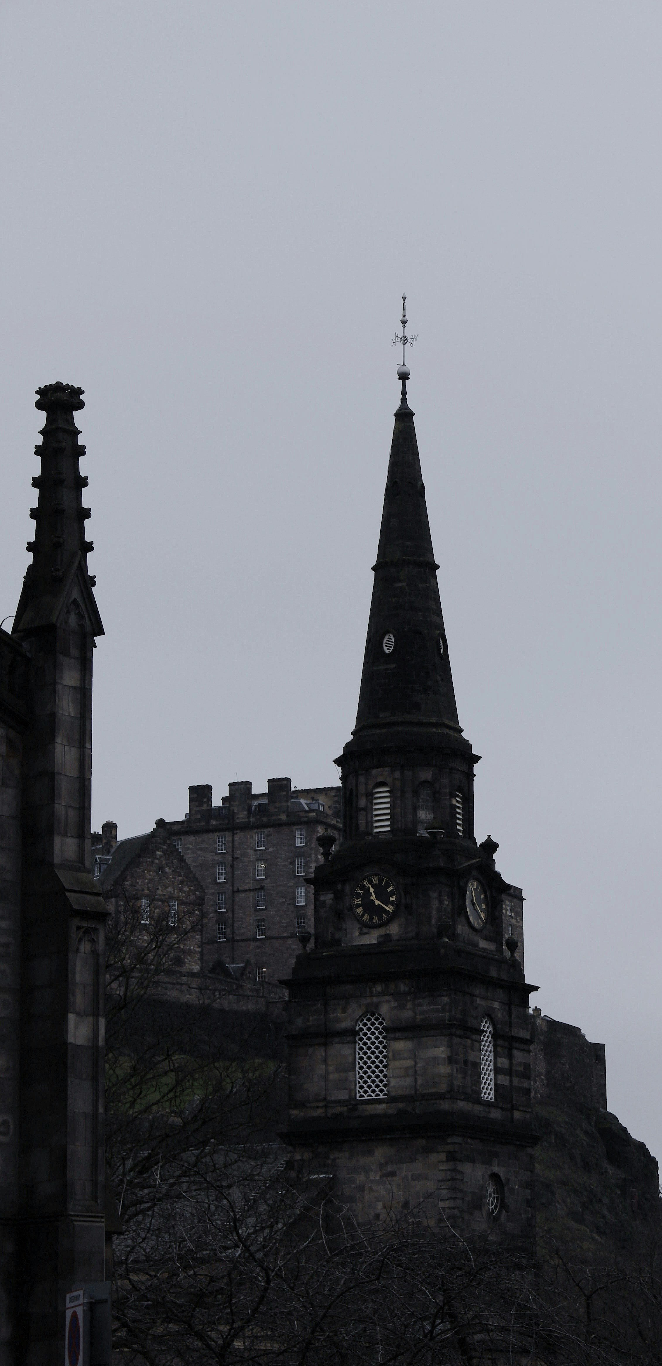 Sentinel on the Cliff: Clocktower Rising Over a Medieval Bastion
