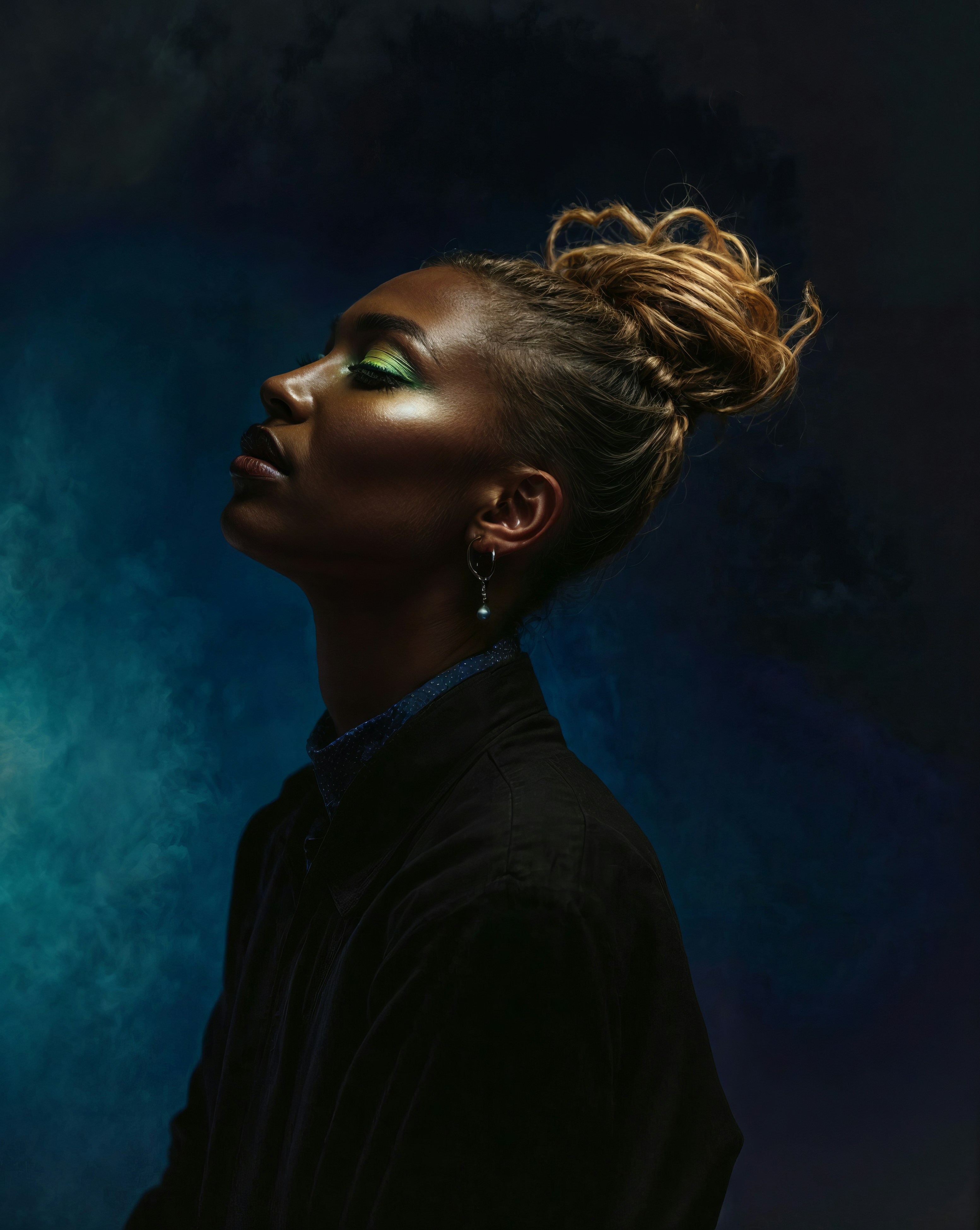 A woman with her hair in a bun and green eyeshade photo – Free Portrait ...