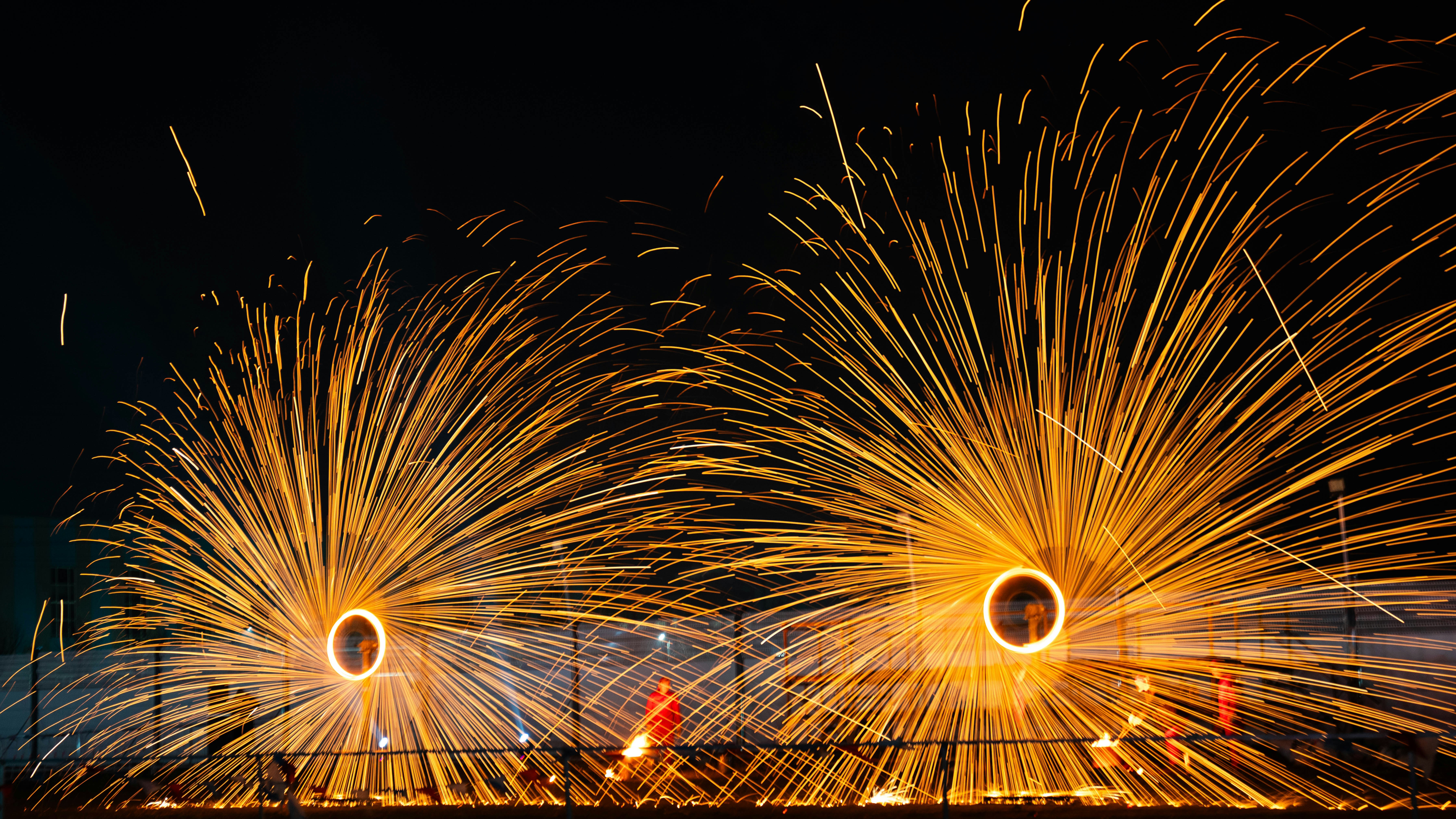 A couple of fireworks that are in the air photo – Free Human Image on ...