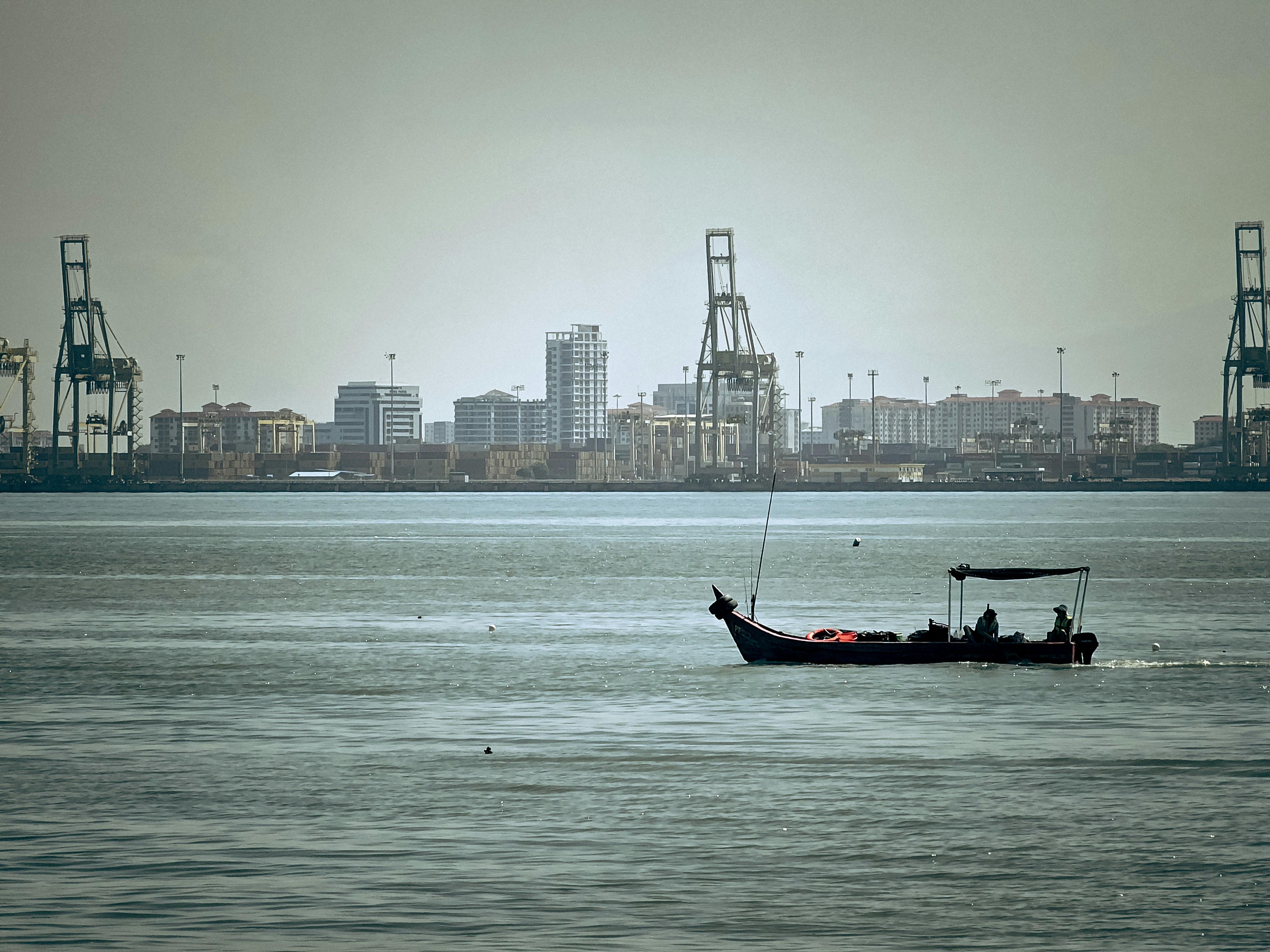 Lone Vessel Before the Steel Spine