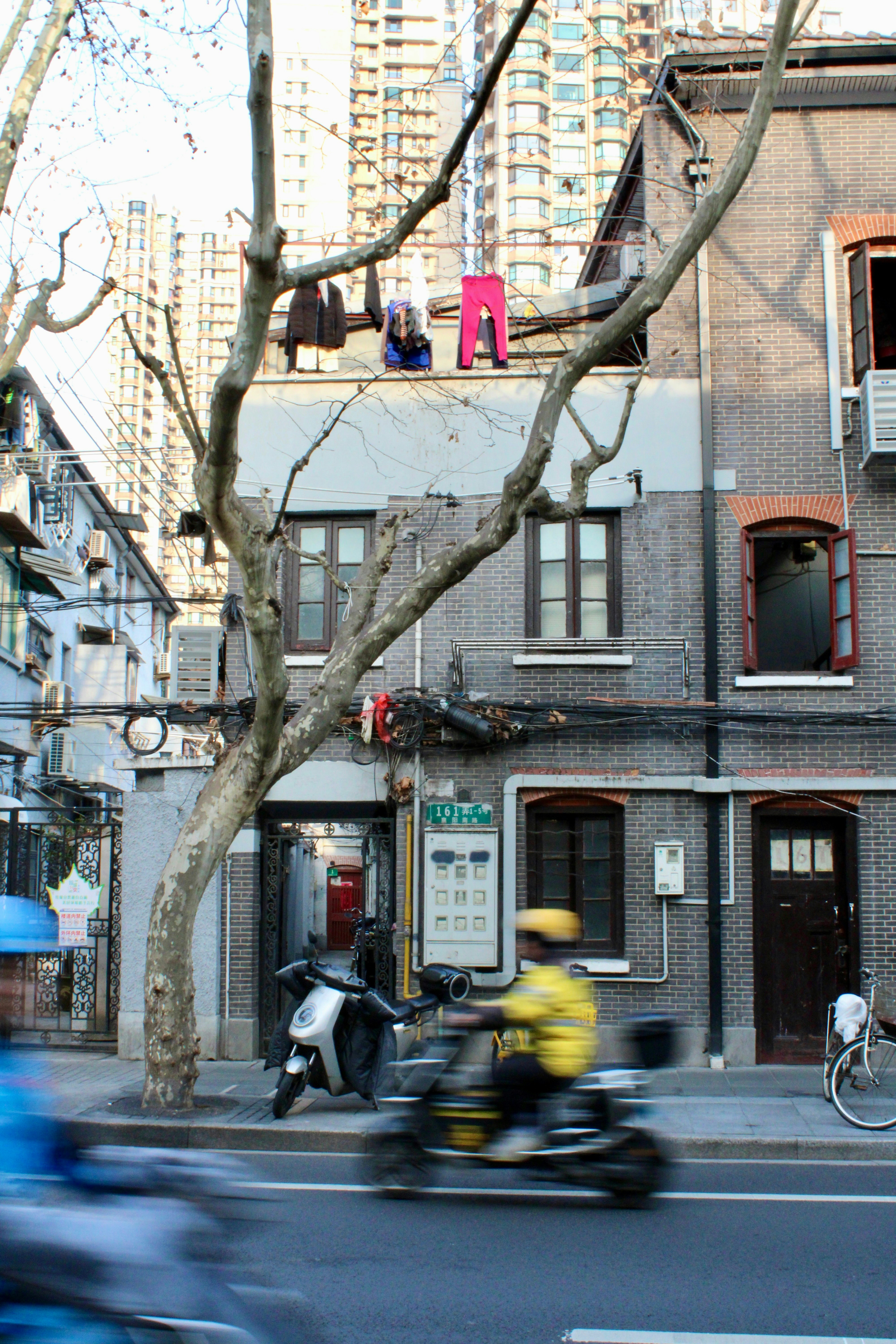 Laundry Lines Among Brick Towers