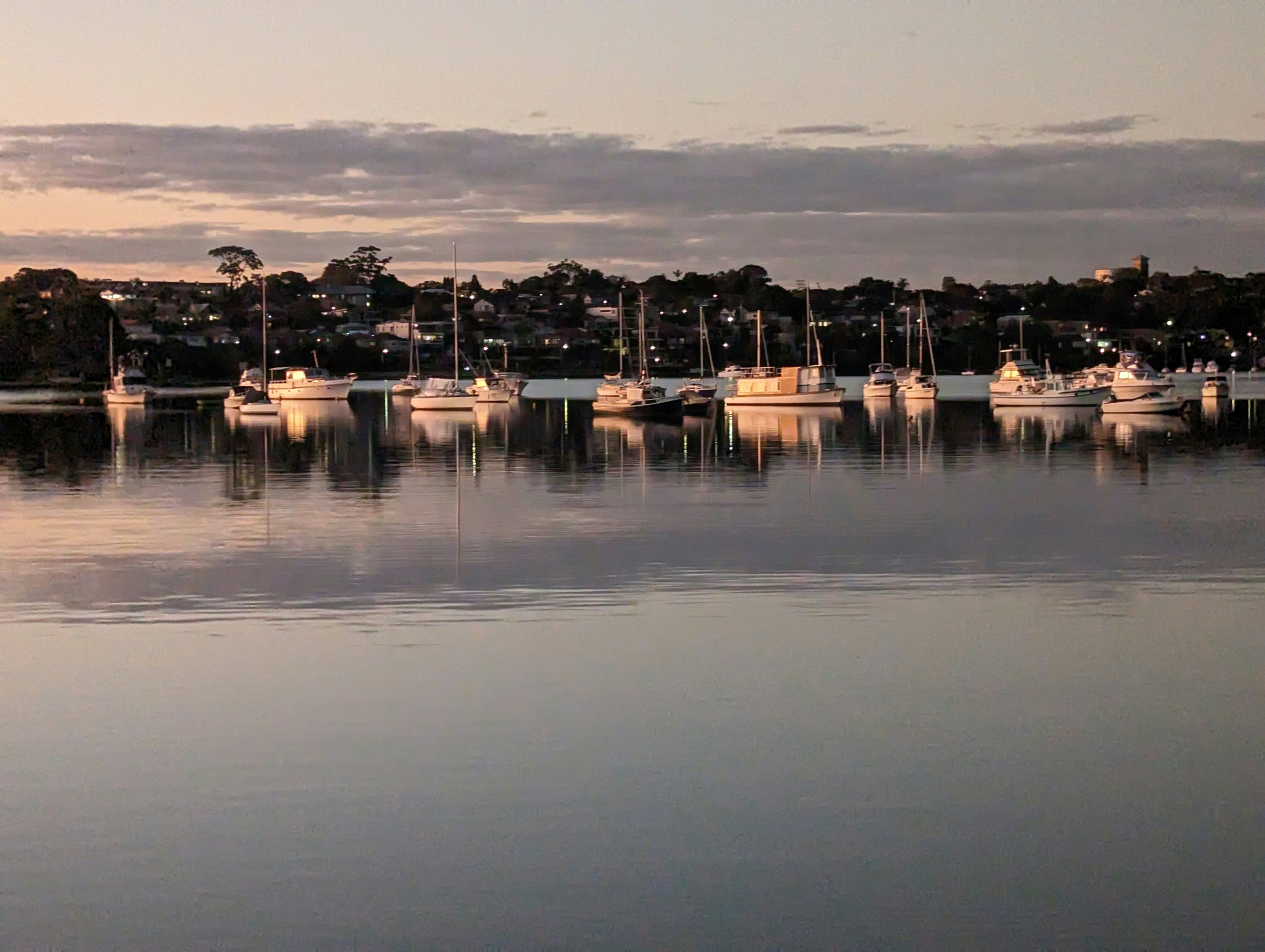 A group of boats floating on top of a lake photo – Free Sydney nsw ...