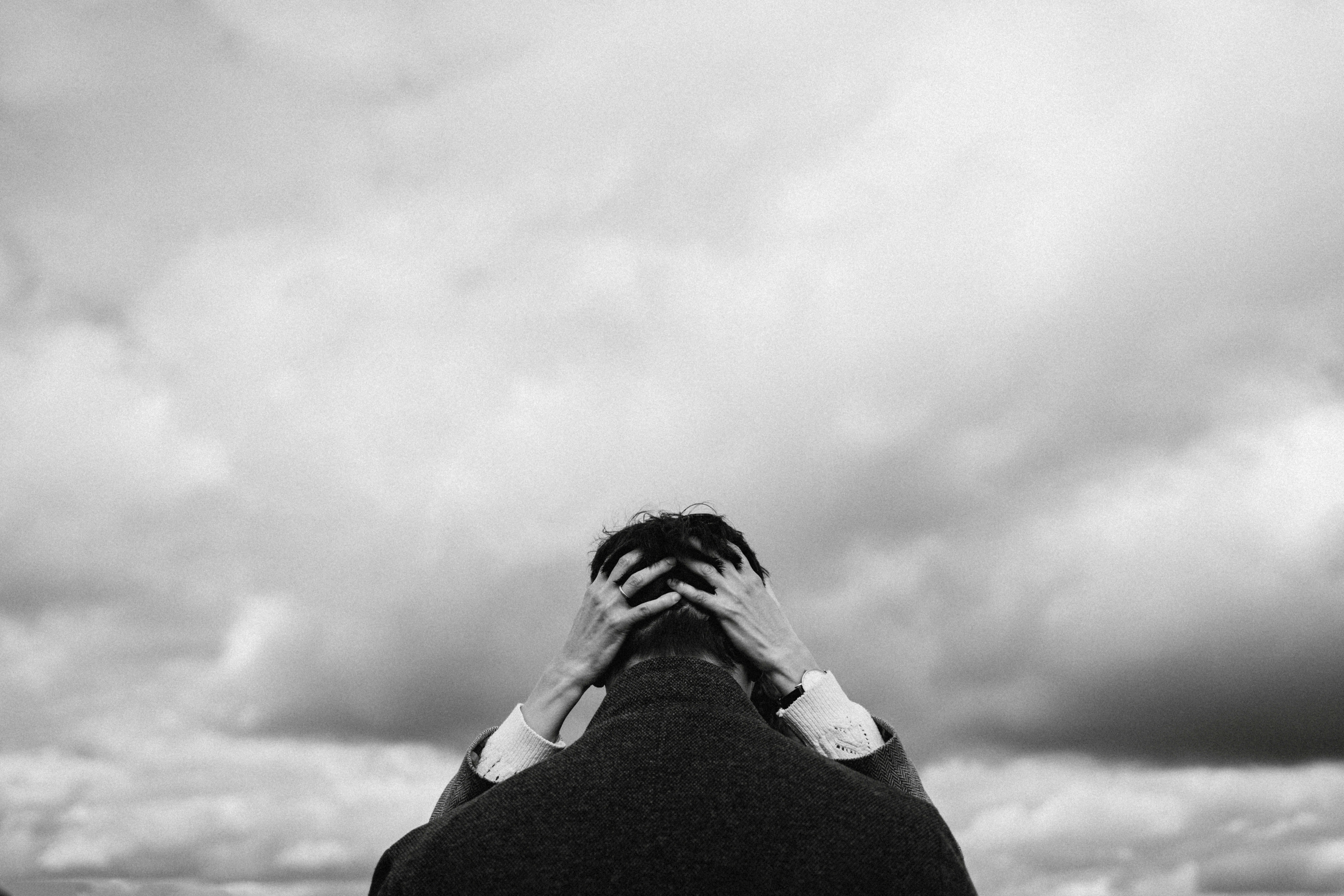 A person covering their face with their hands photo – Free Smile Image ...