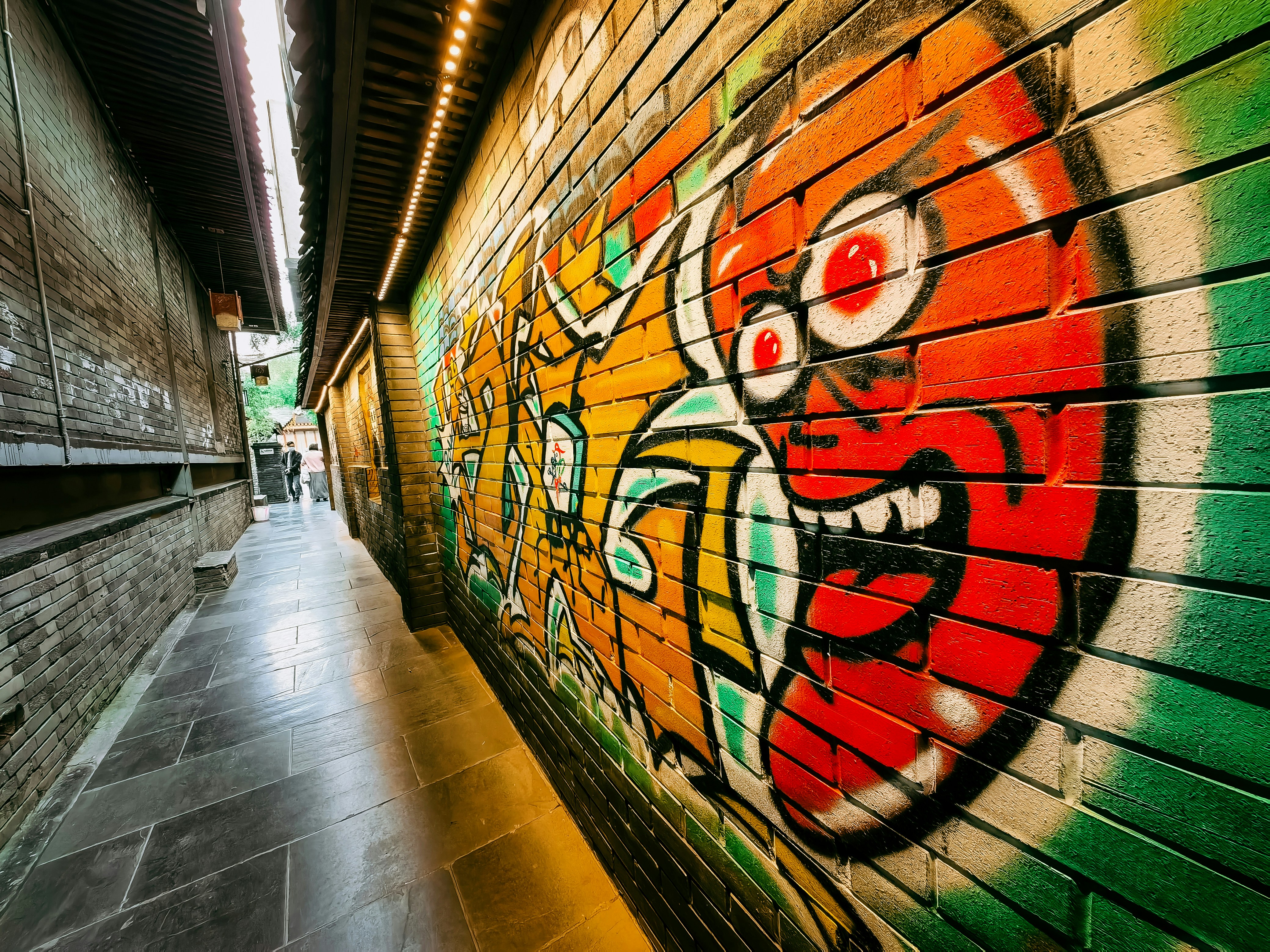 Red Cyclone Graffiti in a Neon-lit Brick Alley