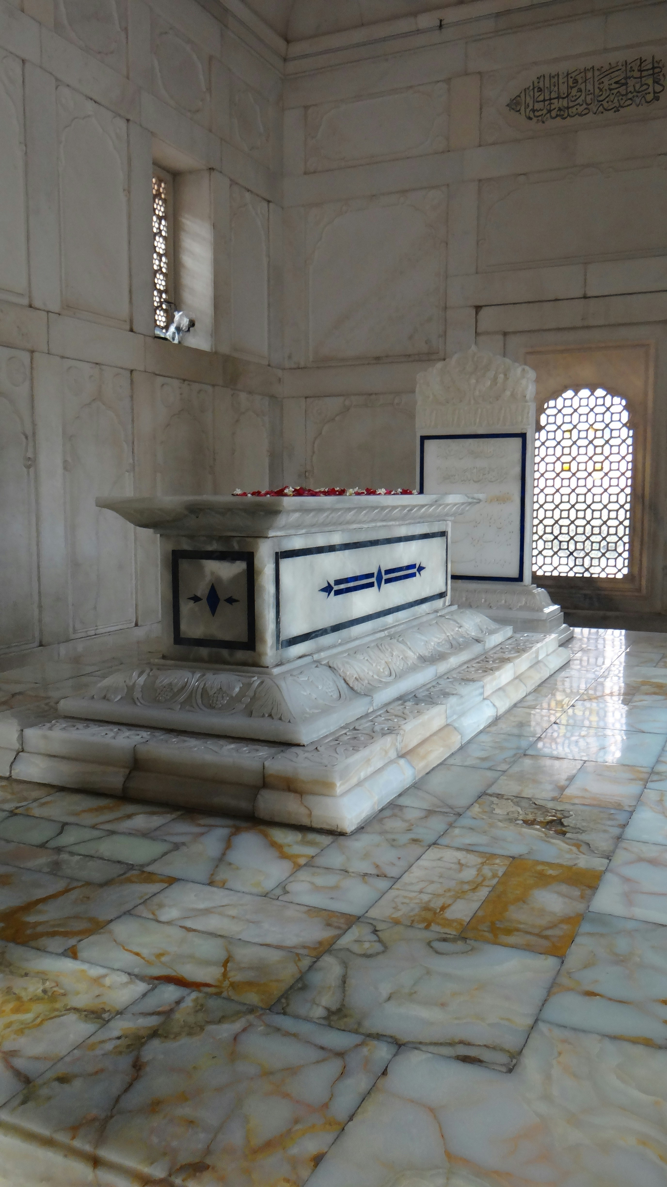 Petaled Marble Altar Framed by a Geometric Lattice Window