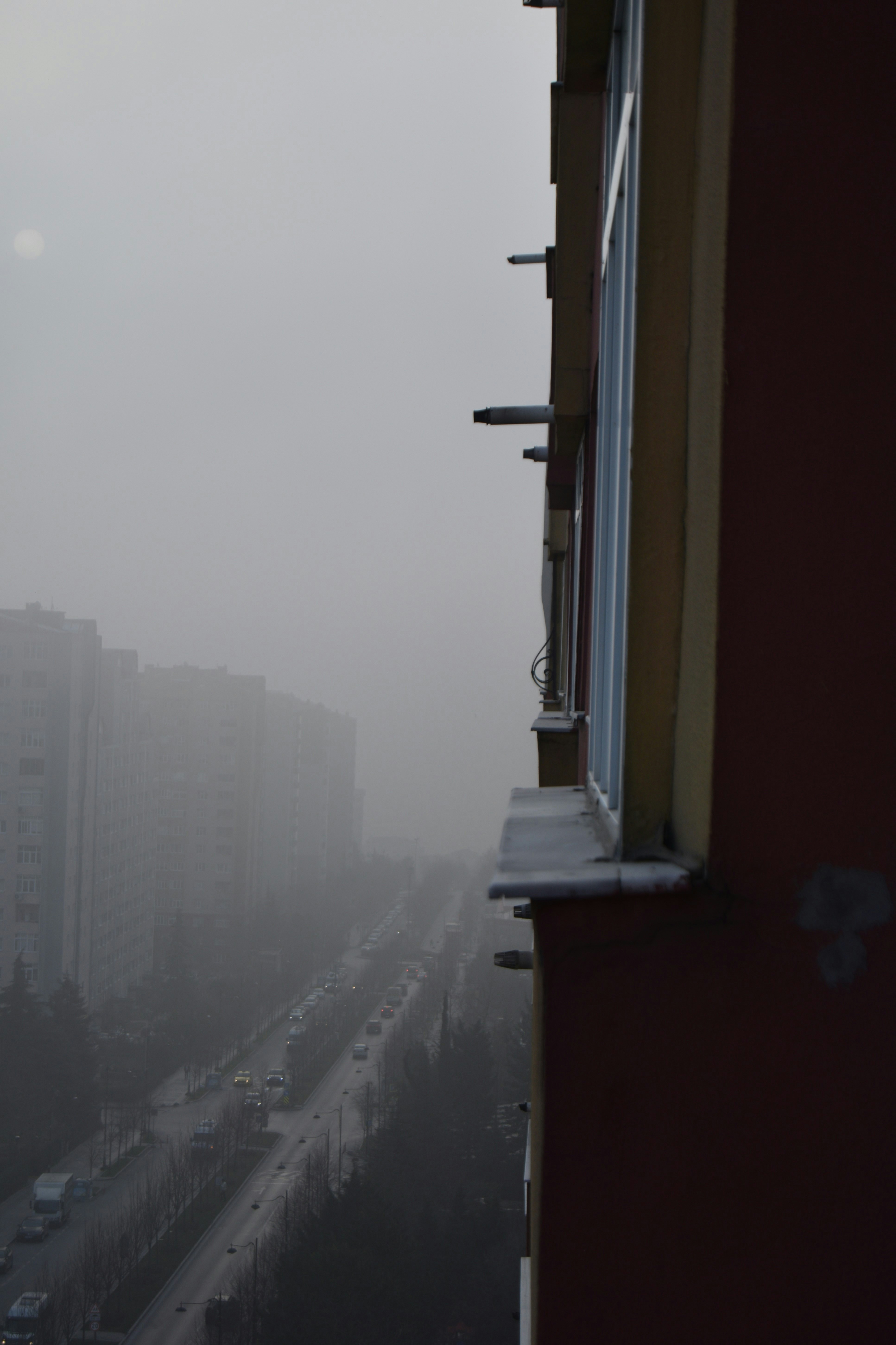 Fogbound Boulevard from a Narrow Balcony