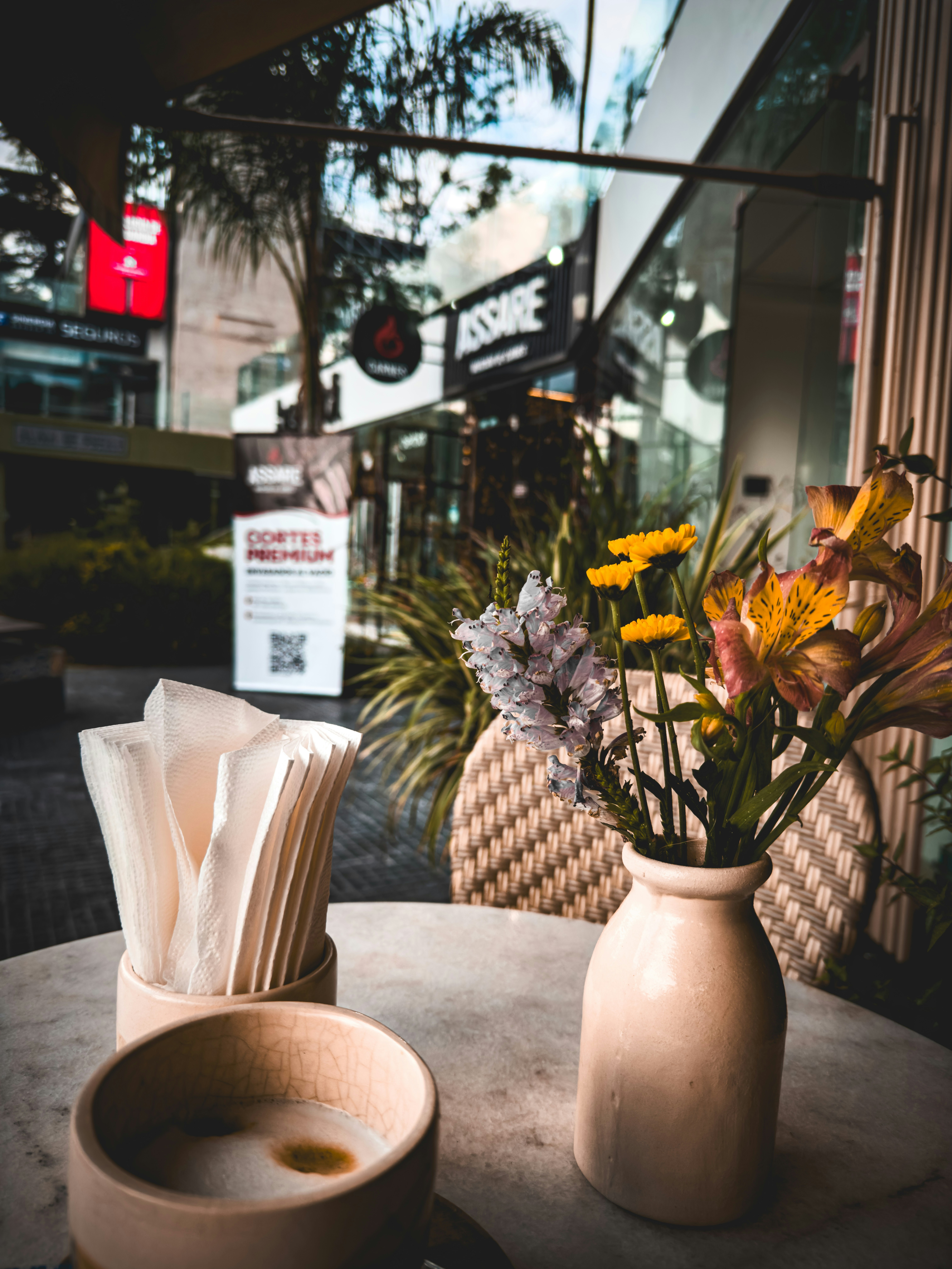 Blooming still life at a sunlit cafe corner