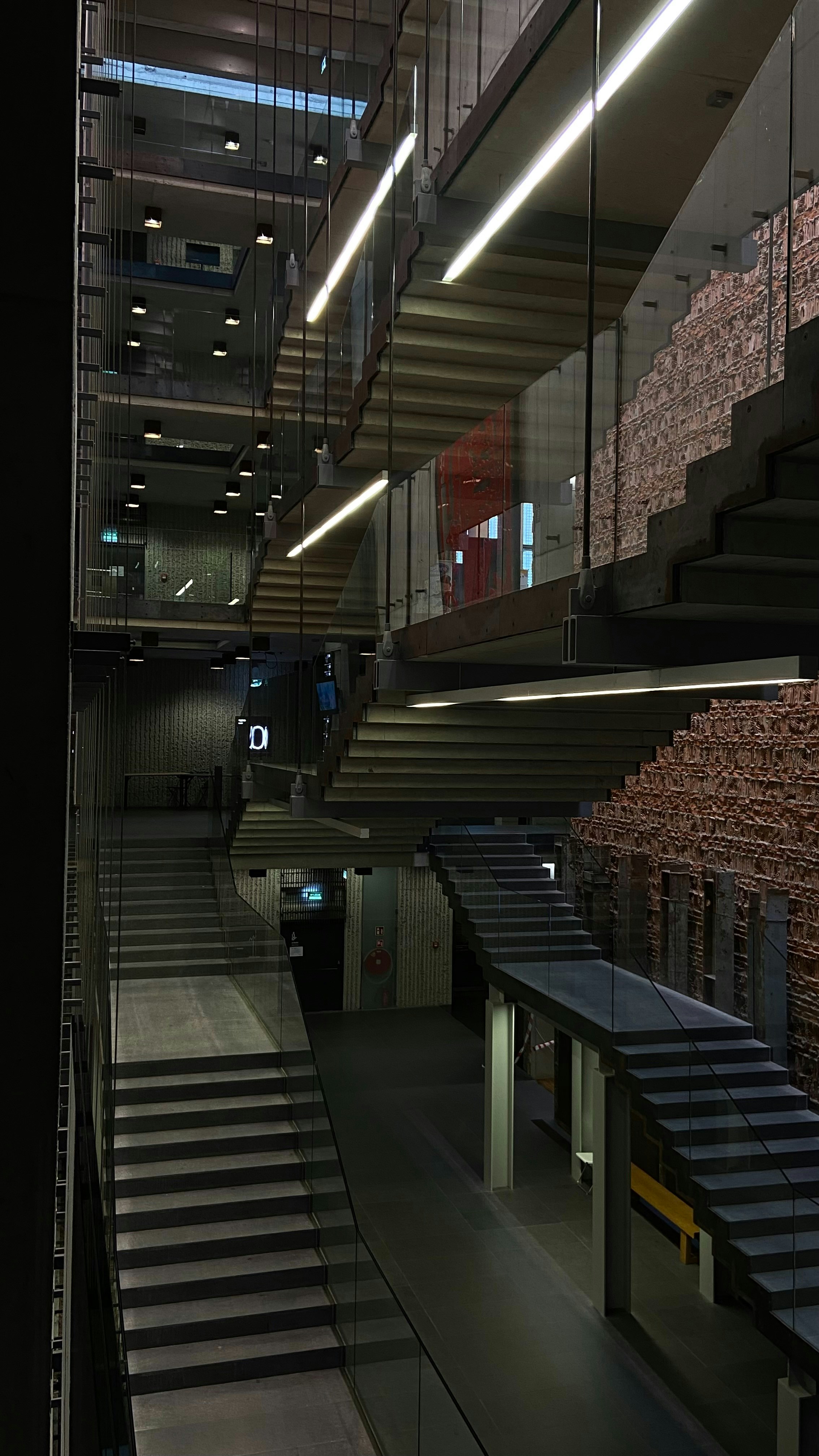 Midnight Atrium: A Network of Floating Glass Staircases