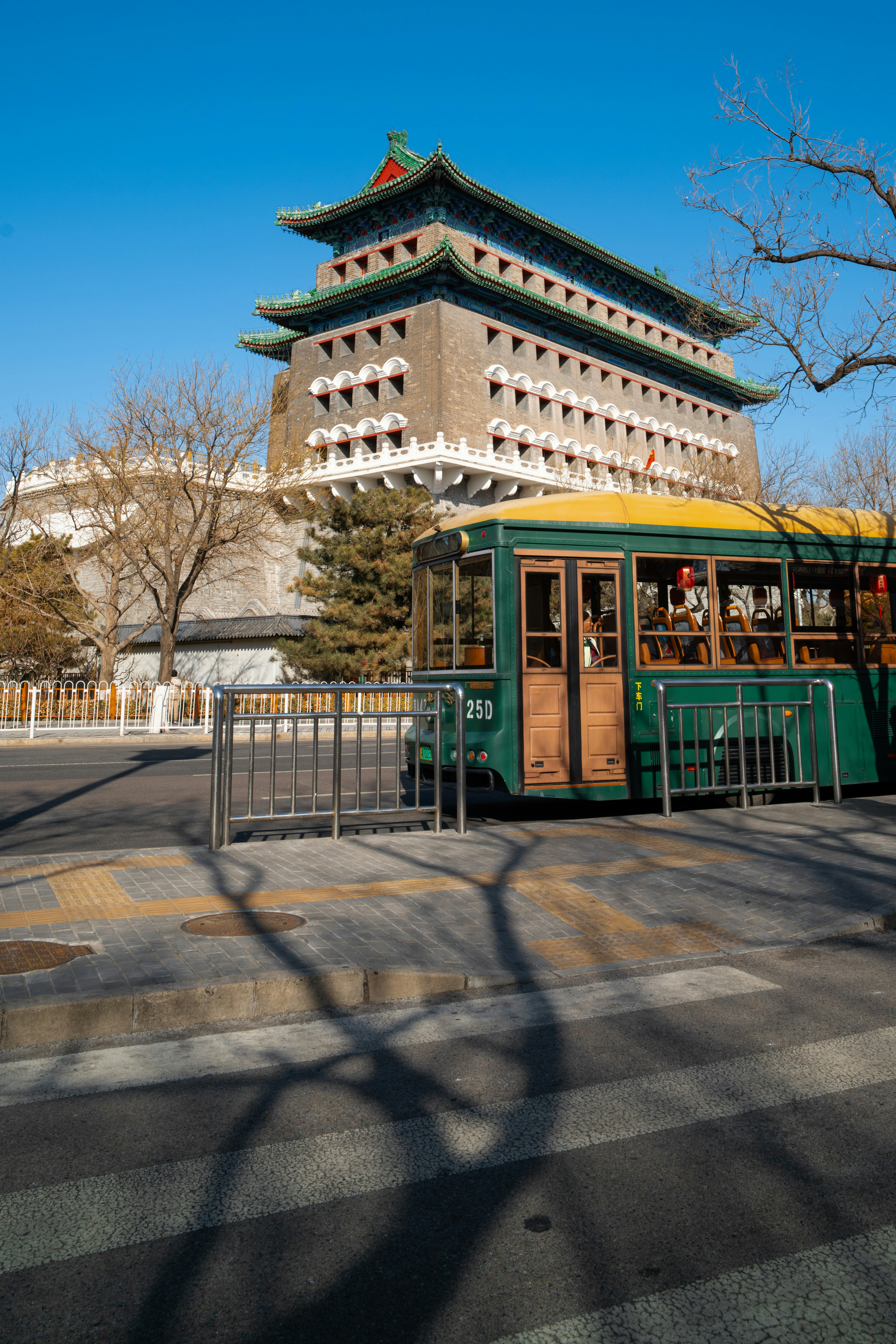 Traditional paged silhouette over a vintage tram