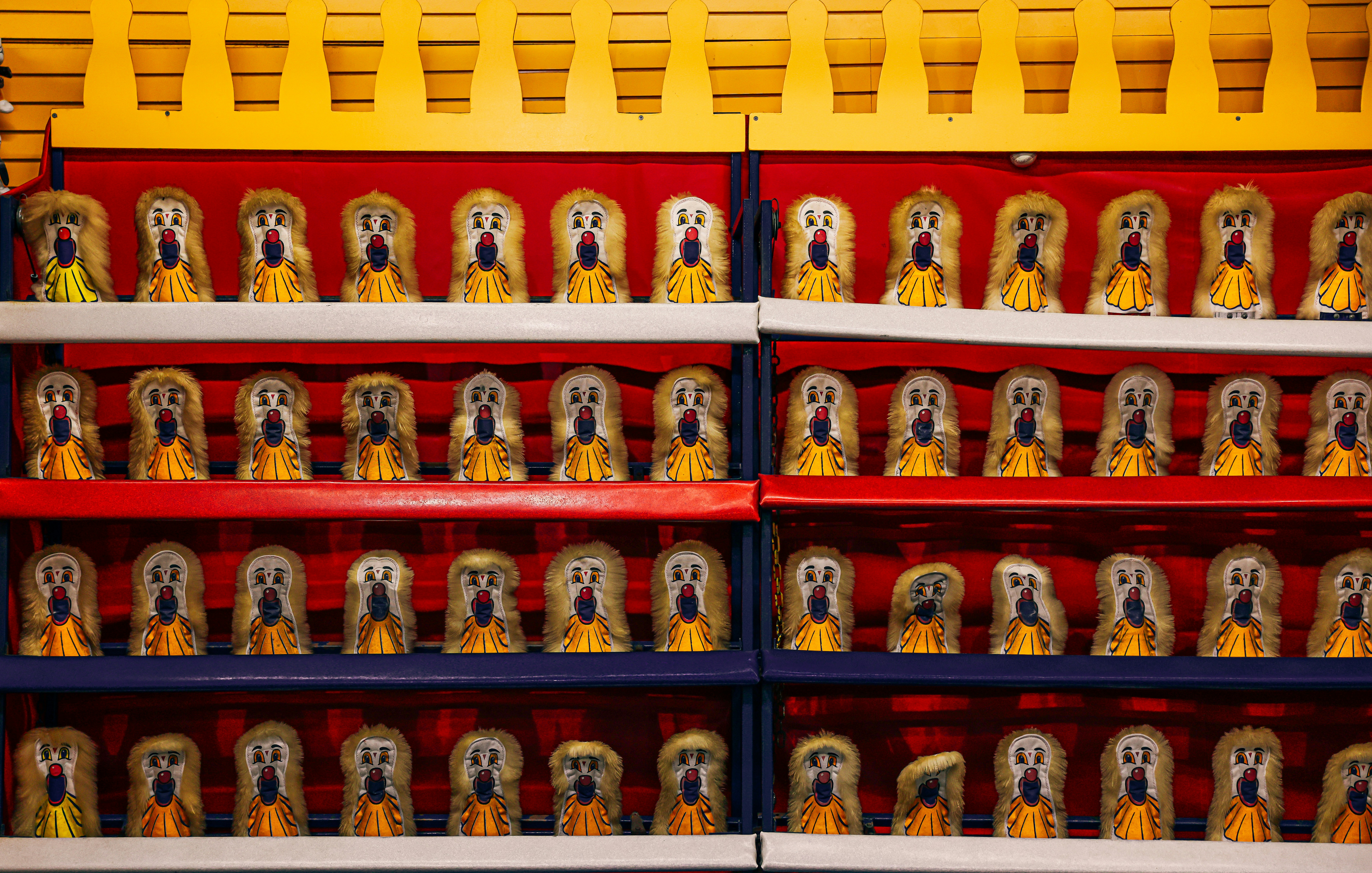 A shelf filled with lots of different types of figurines photo – Free ...