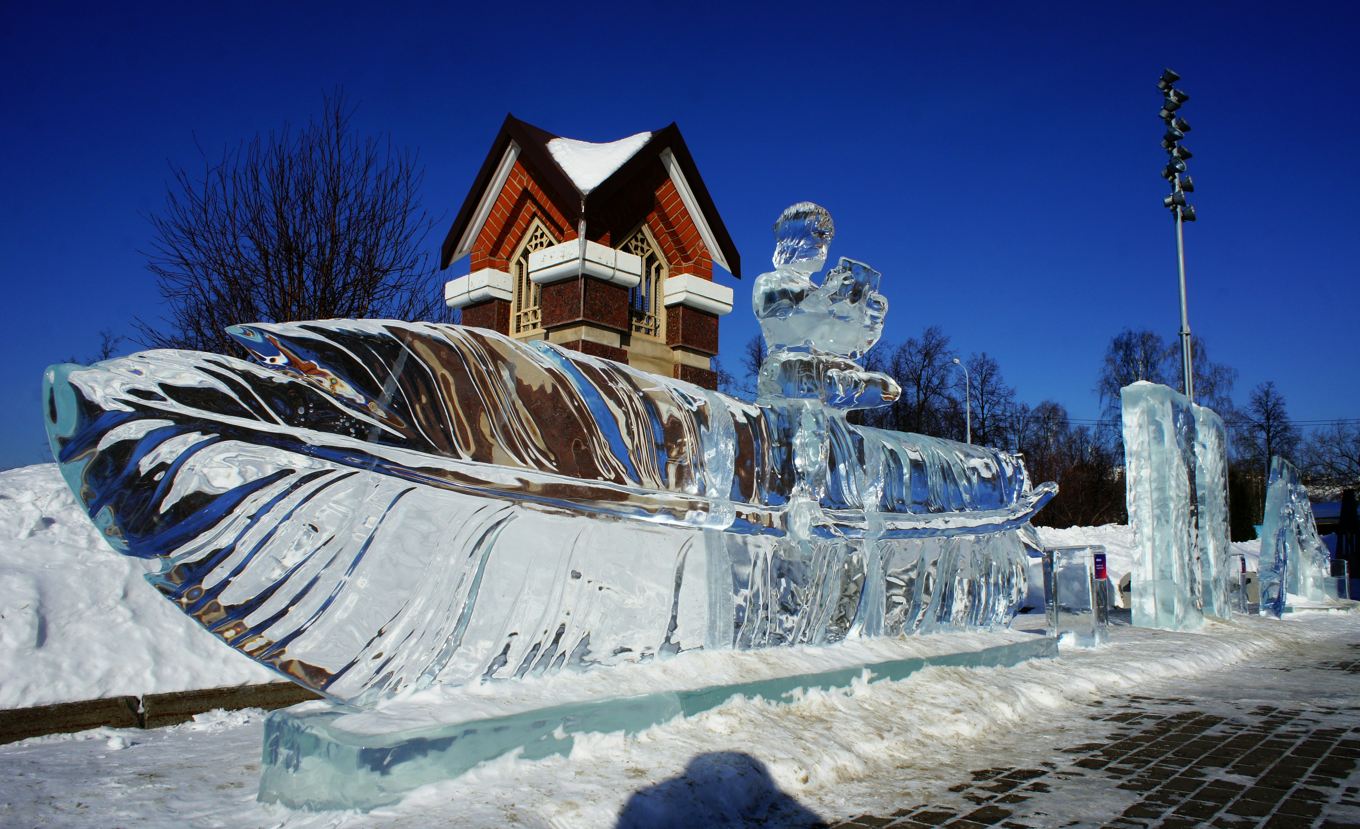 Crystal Crest of Winter: Ice Vessel Under a Pristine Azure Sky