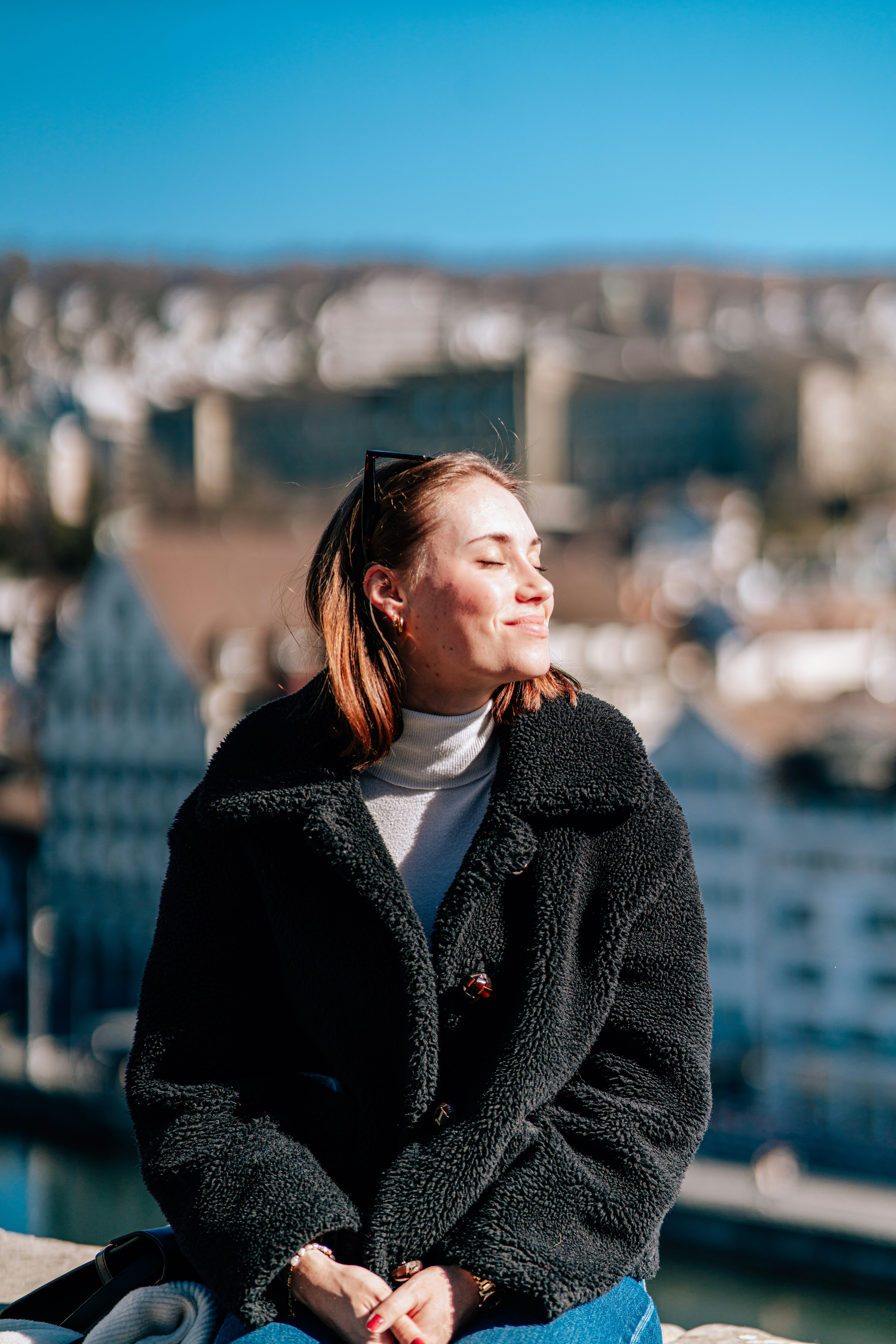 Sunlit Contemplation Over the Harbor: A Quiet Portrait