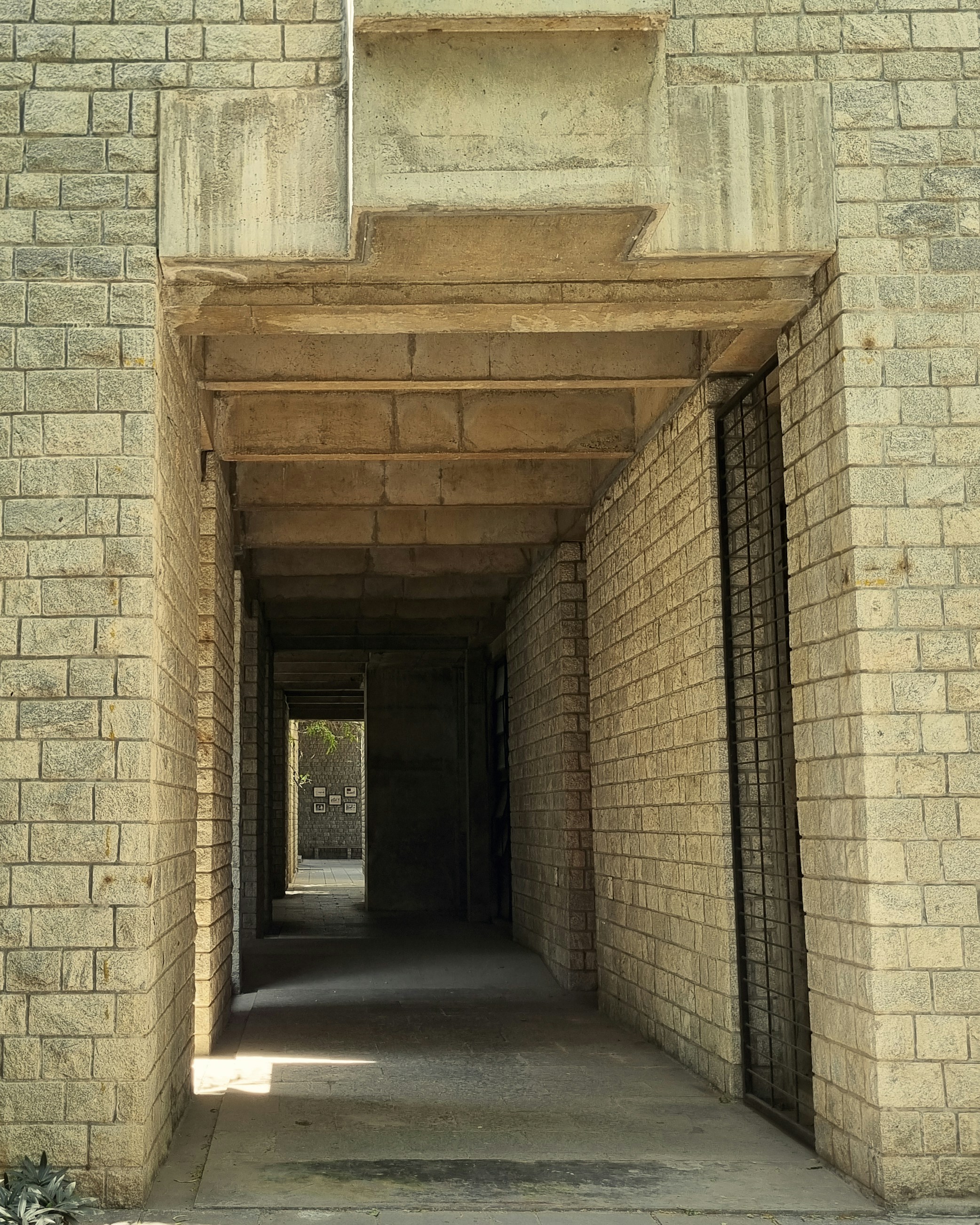 Threshold of Light: A Long Corridor of Stone and Shadow