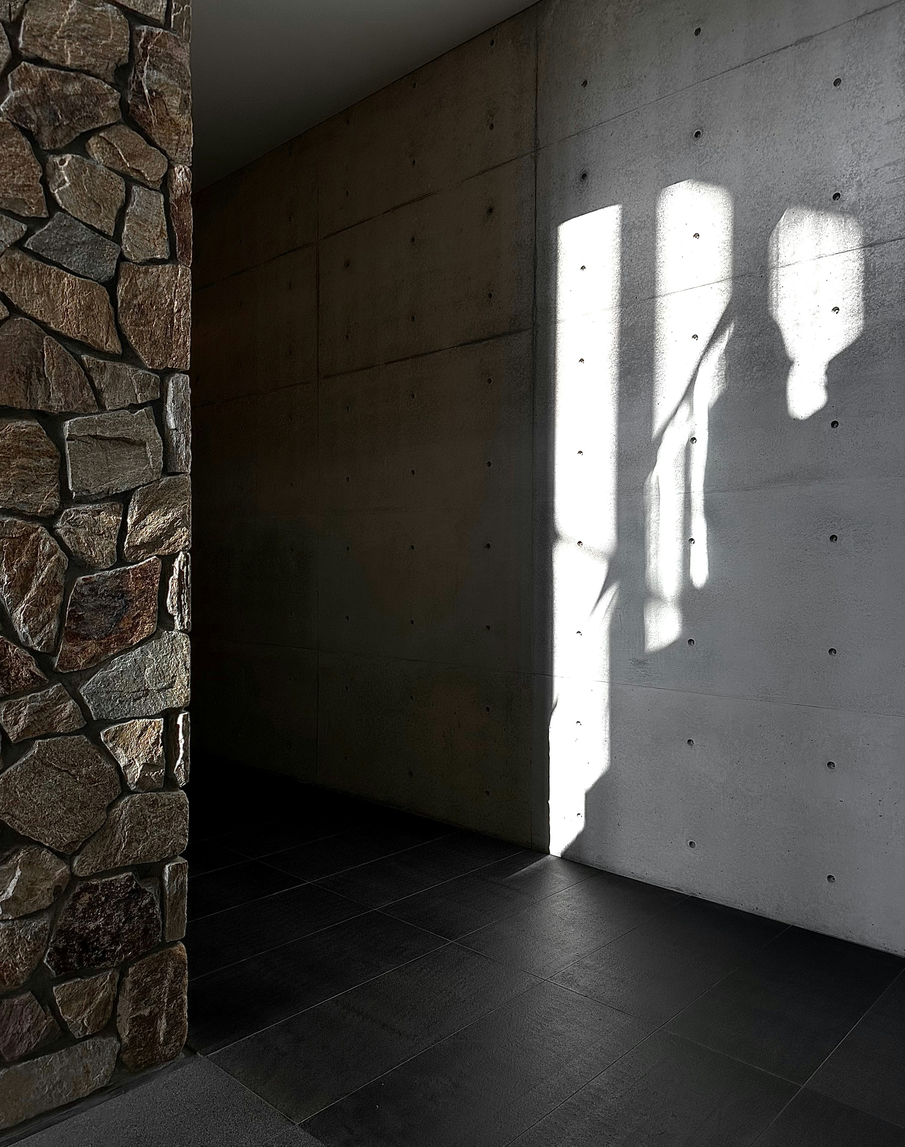 Sunlit Geometry in the Stone-and-Concrete Corner