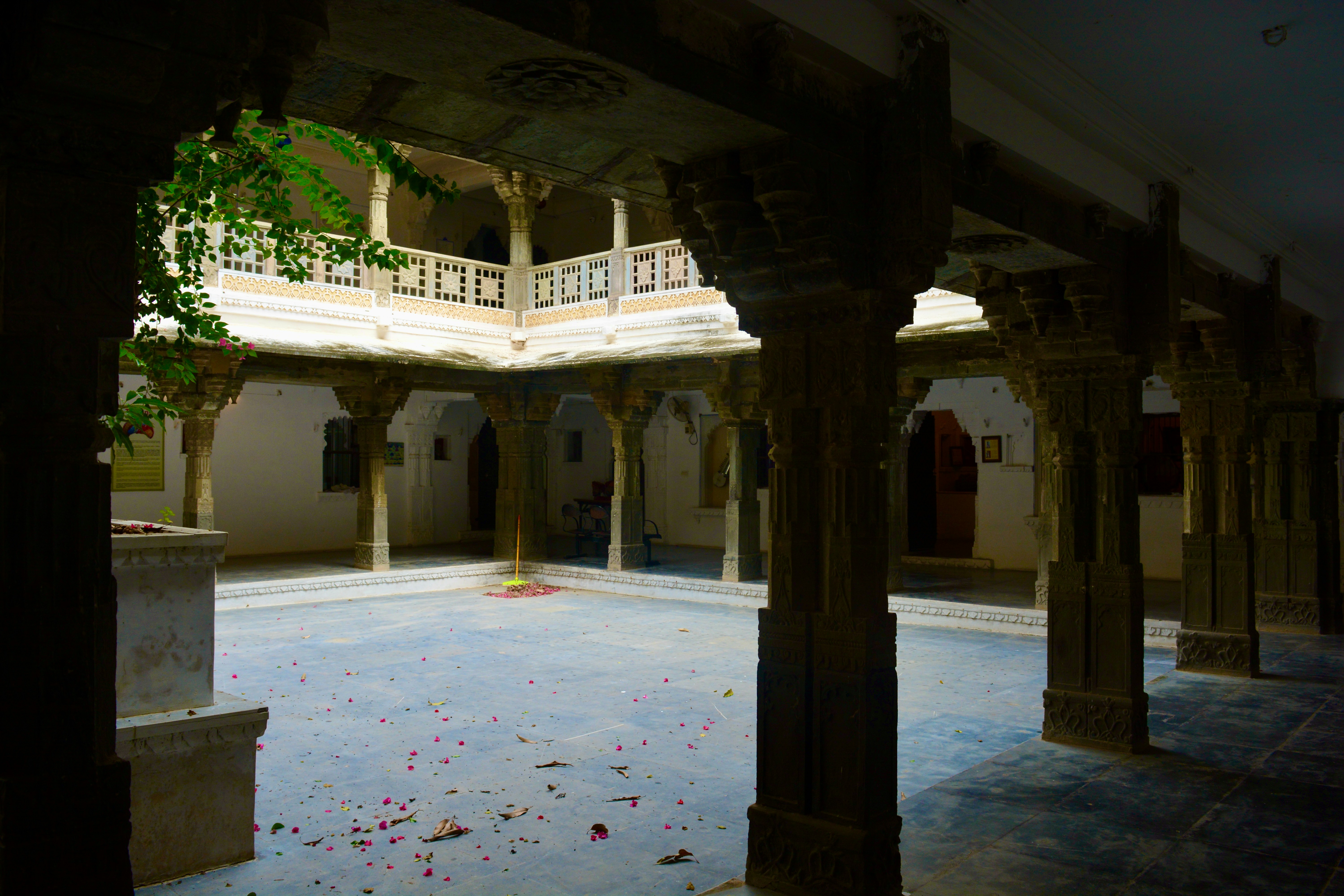Courtyard of Light and Shadow Beneath Carved ArchesRimjhim Agrawal