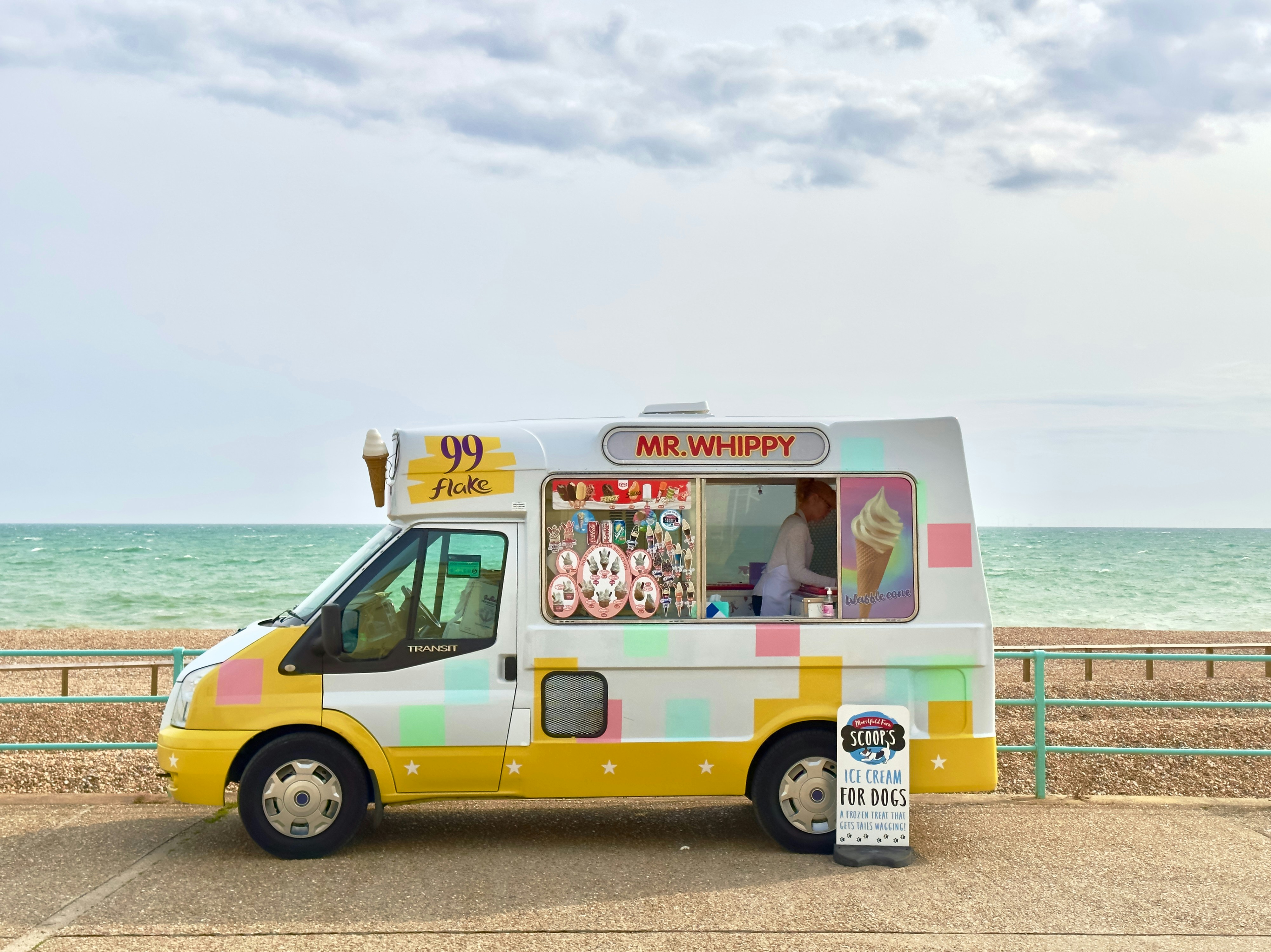 Pastel Ice-Cream Van Gracing a Seaside Promenade