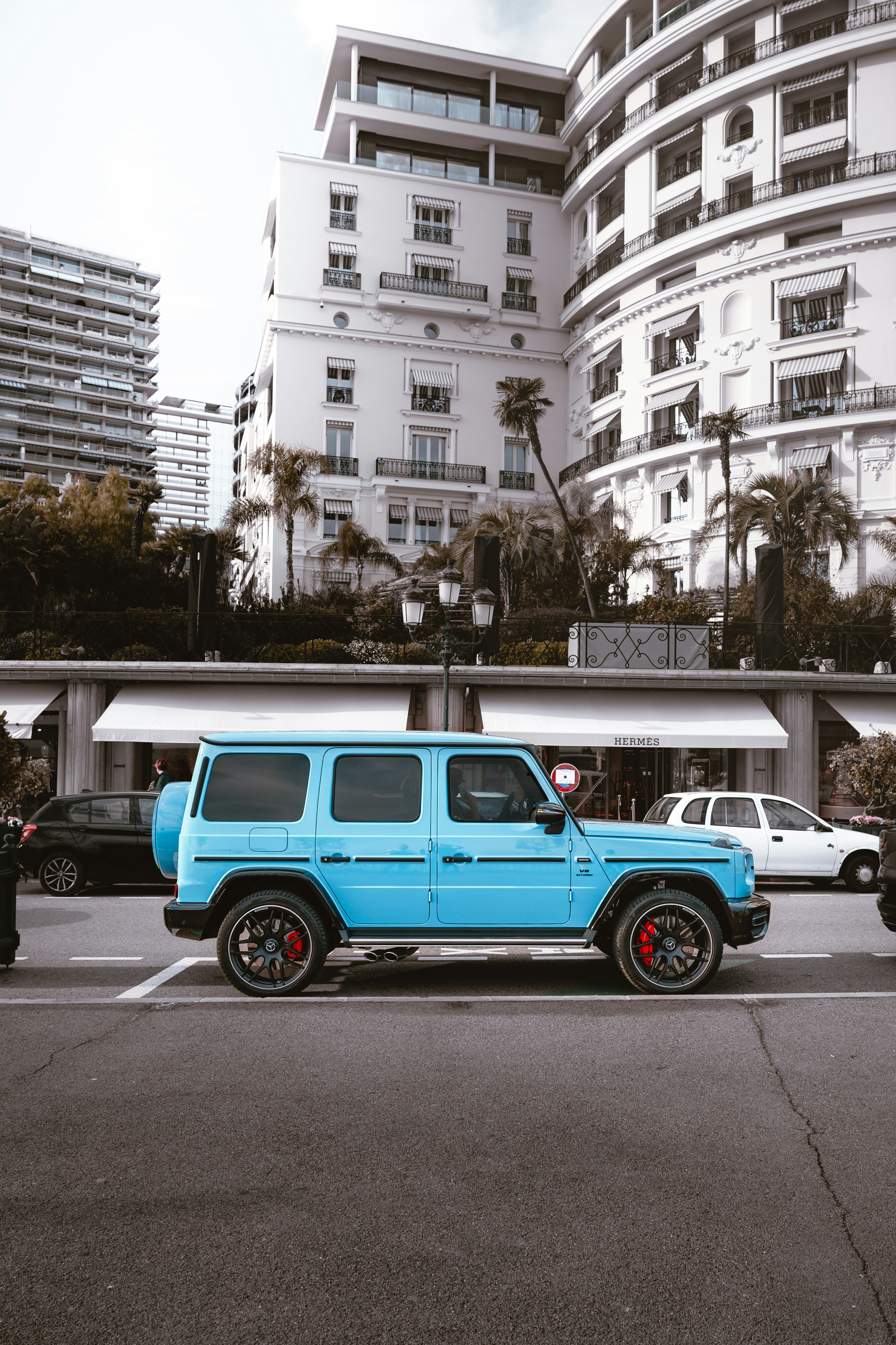 Blue SUV in a Modern Cityscape