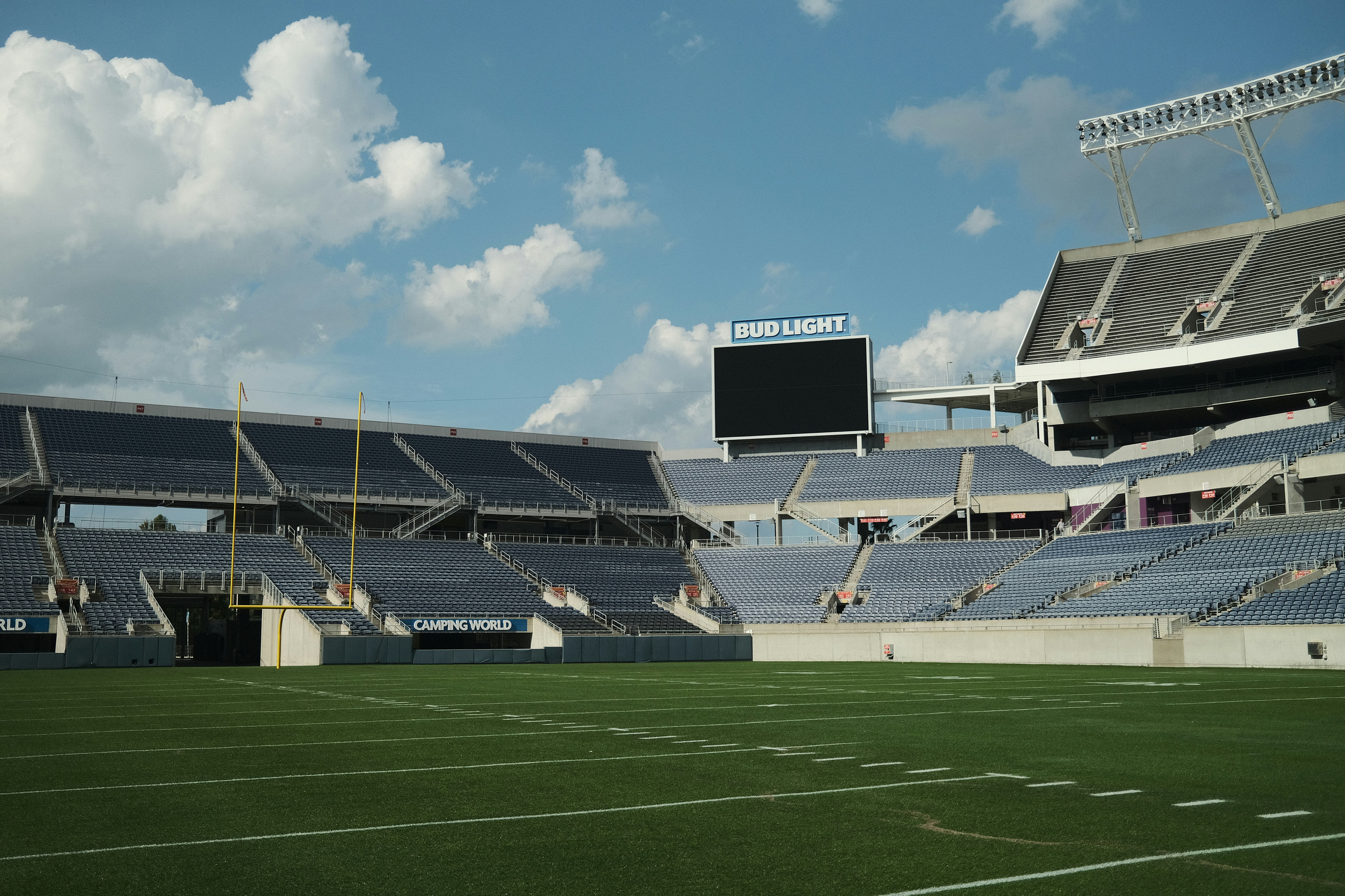 A view of a football stadium from the field photo – Free Field Image on ...