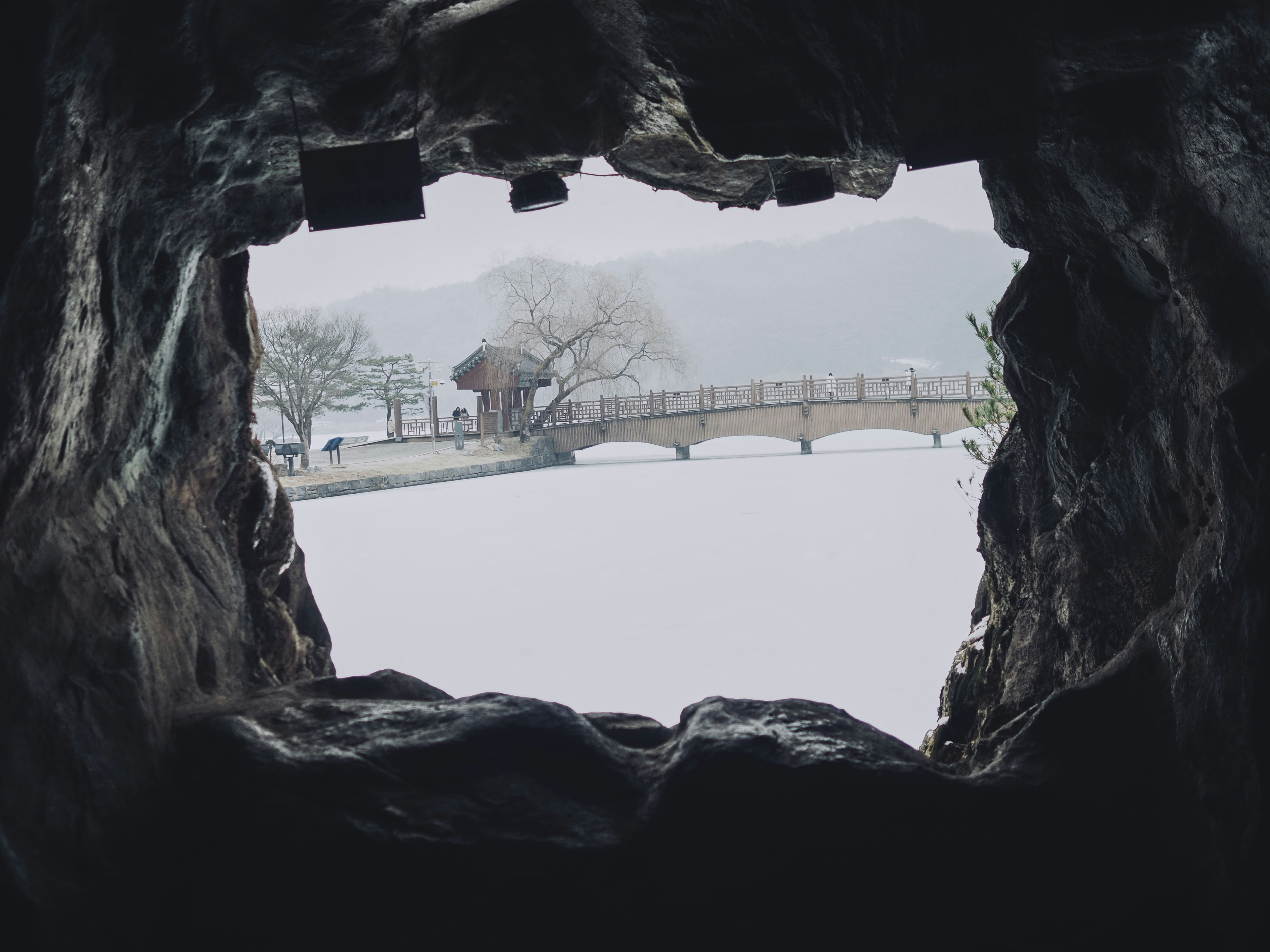 A view of a bridge from inside a cave photo – Free Jecheon-si Image on ...
