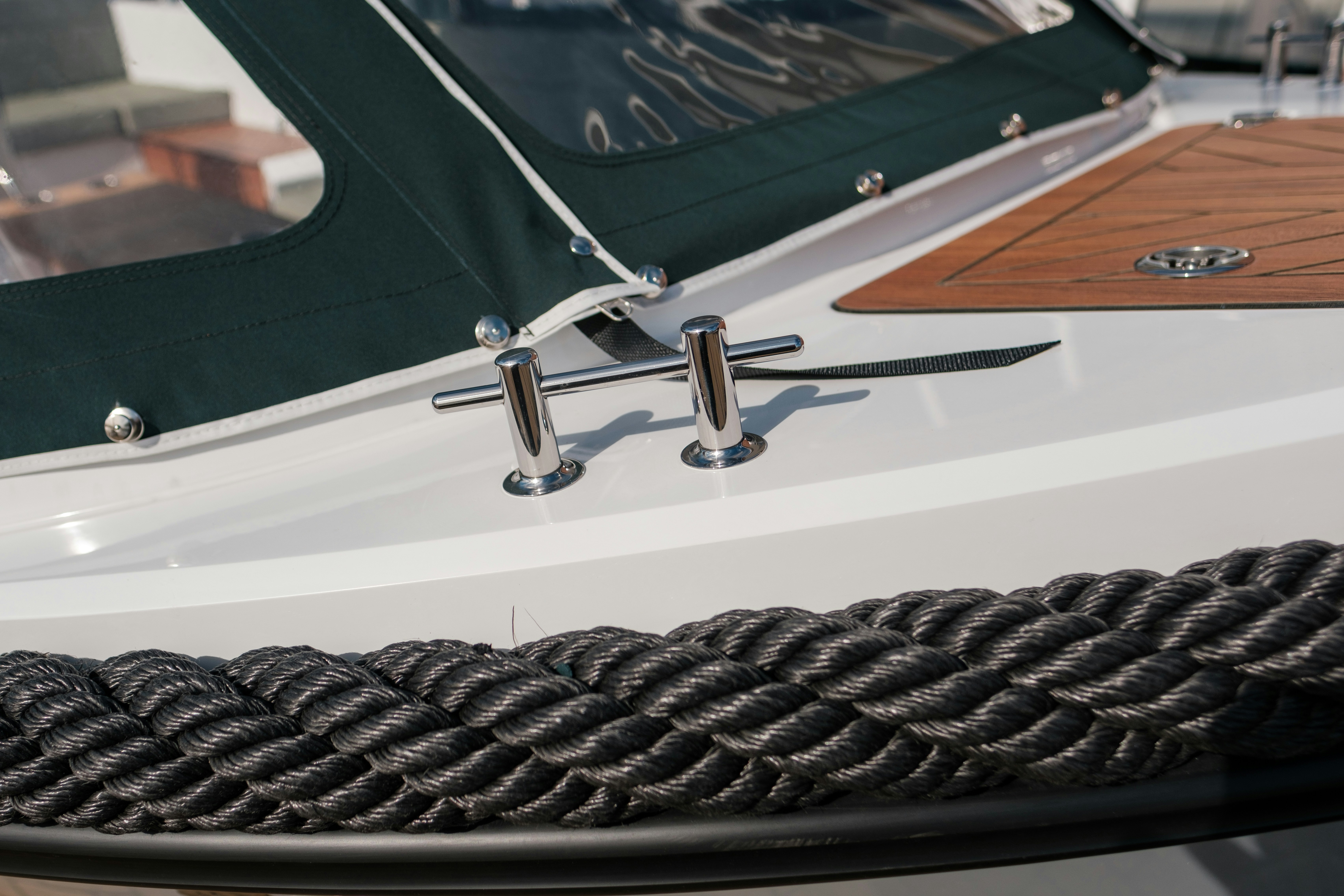 Mooring Line Geometry: Chrome Cleats Meet Braided Rope on a Yacht Deck