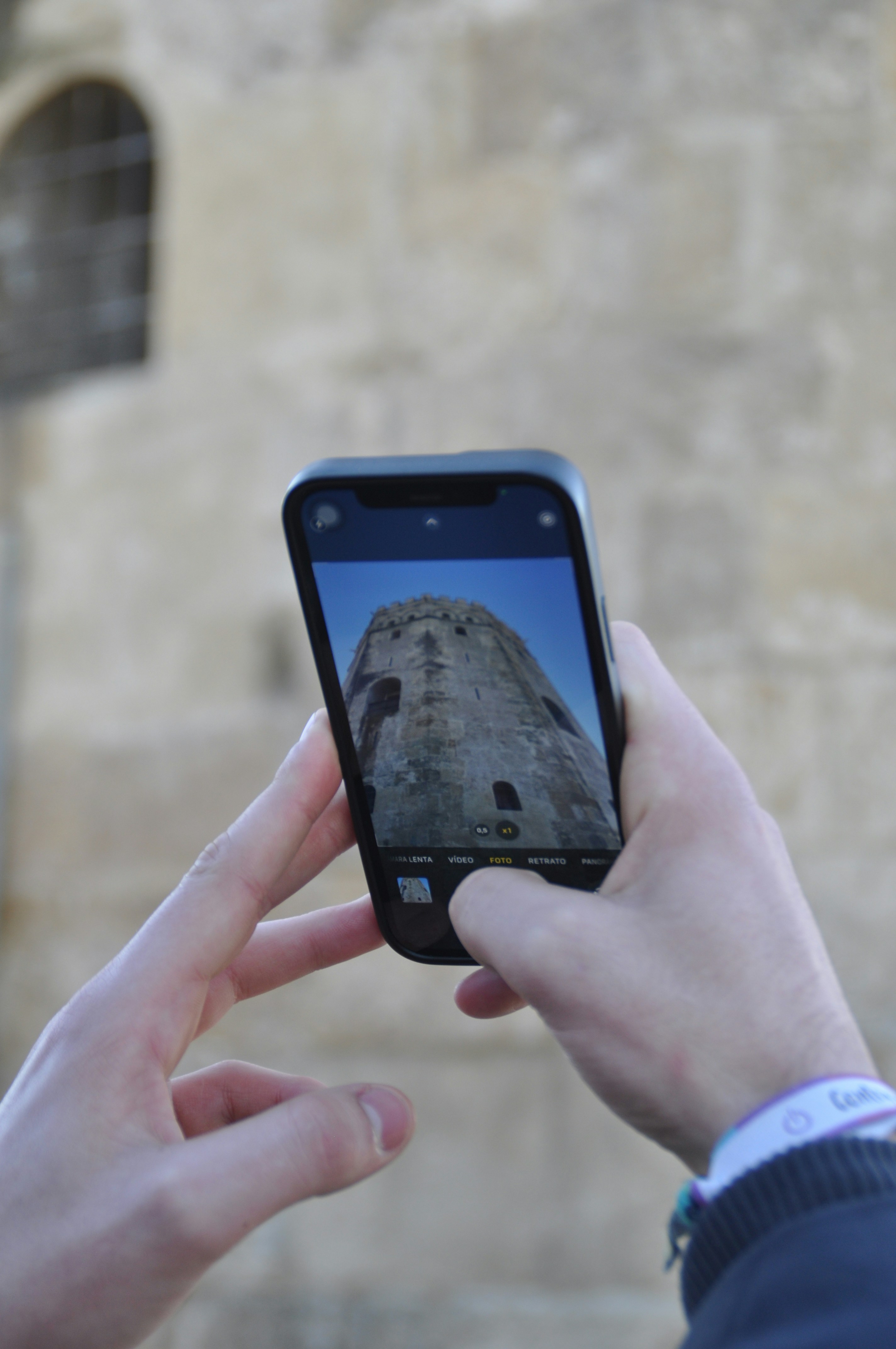 Phone Frame: Capturing a Stone Tower through a Pocket-sized View