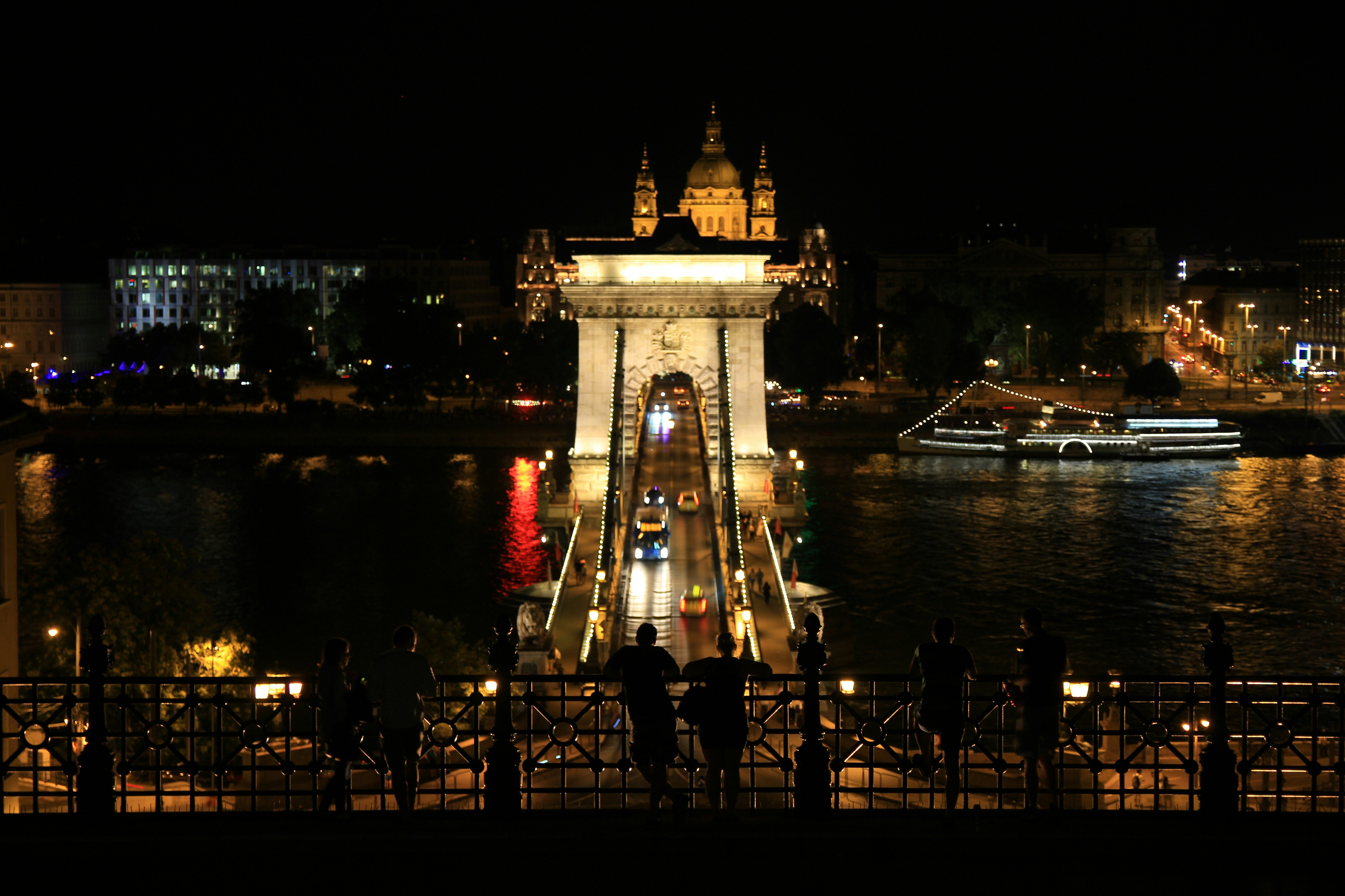 Danube Nightfall: The Chain Bridge Adorned in Amber Light