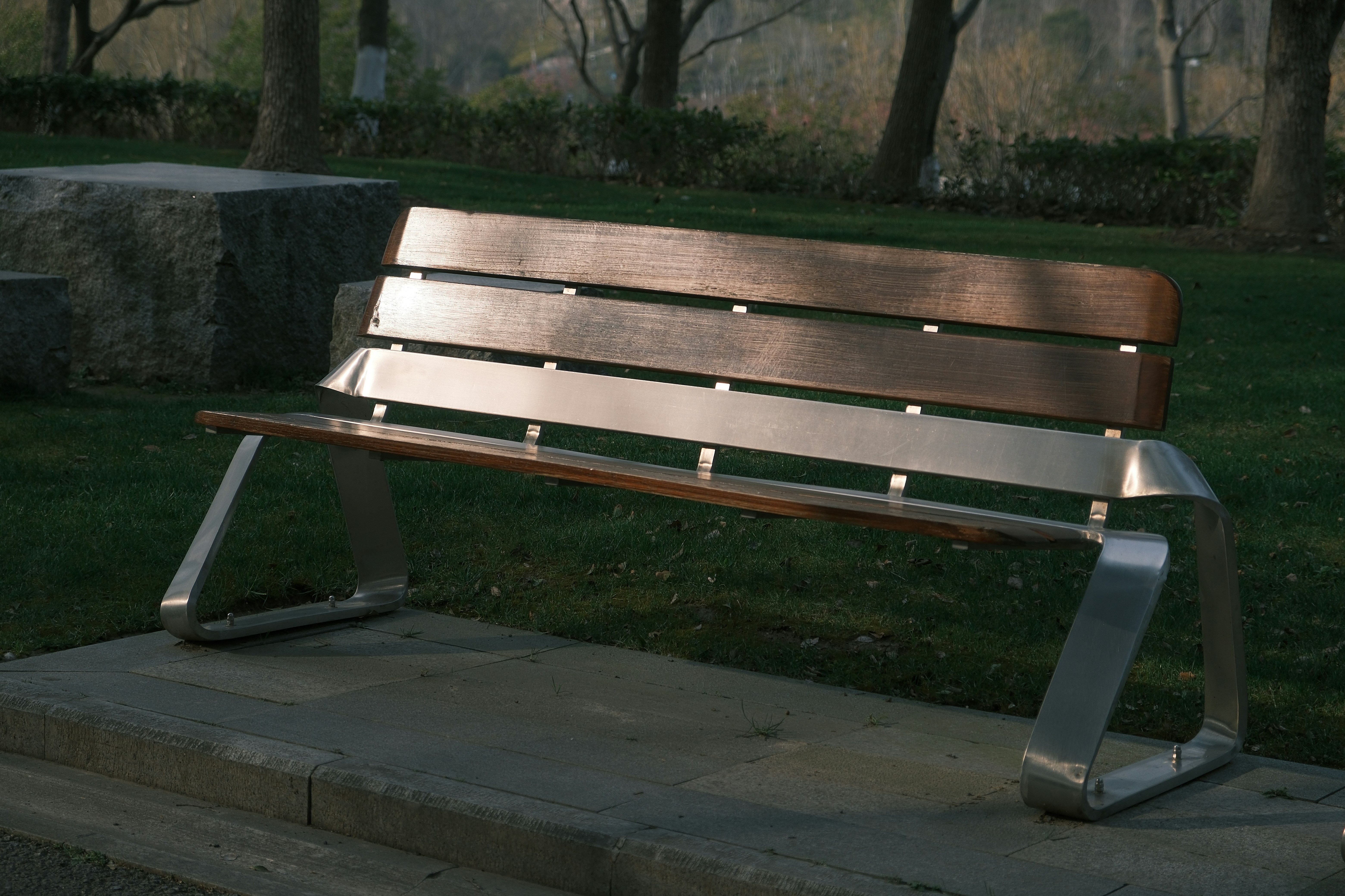 Dappled Light on a Park Bench: Quiet Afternoon in the Green