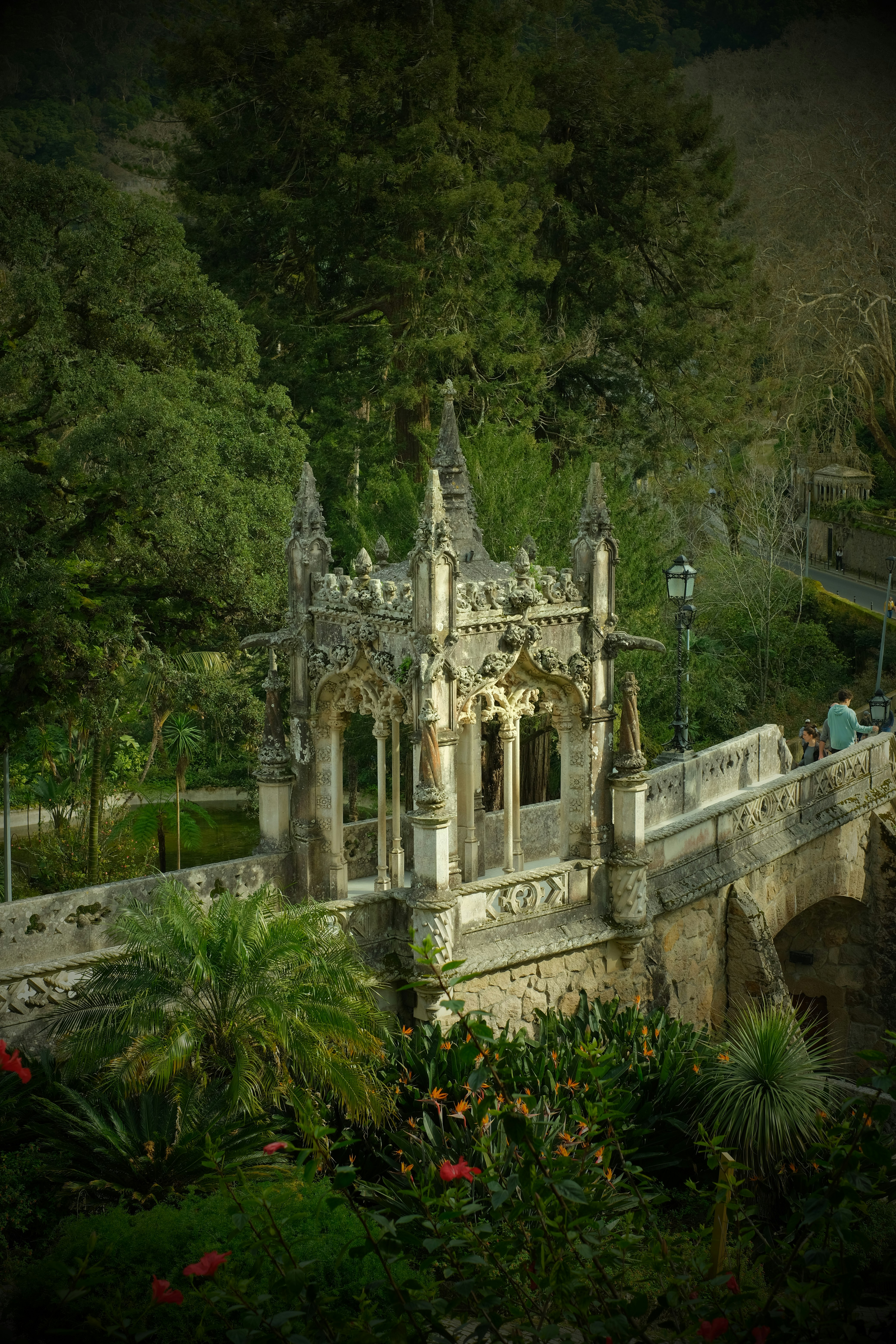 Ornate Gothic Pavilion Rising from a Lush Terrace Garden