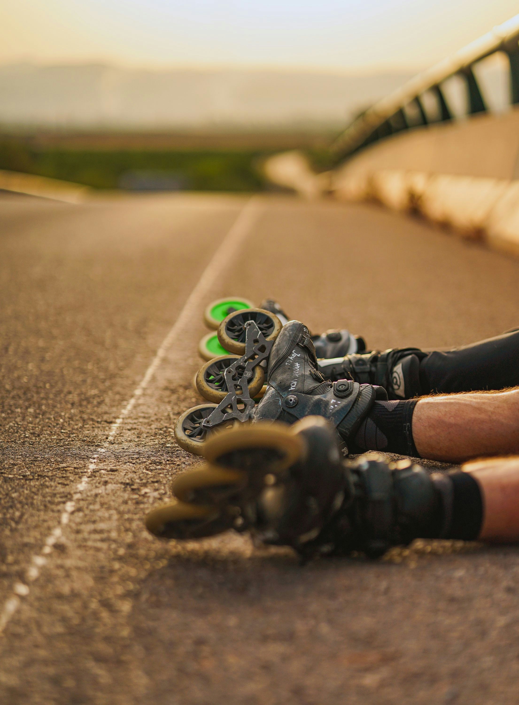 Line of Rollerblades Repose on a Sunrise Track