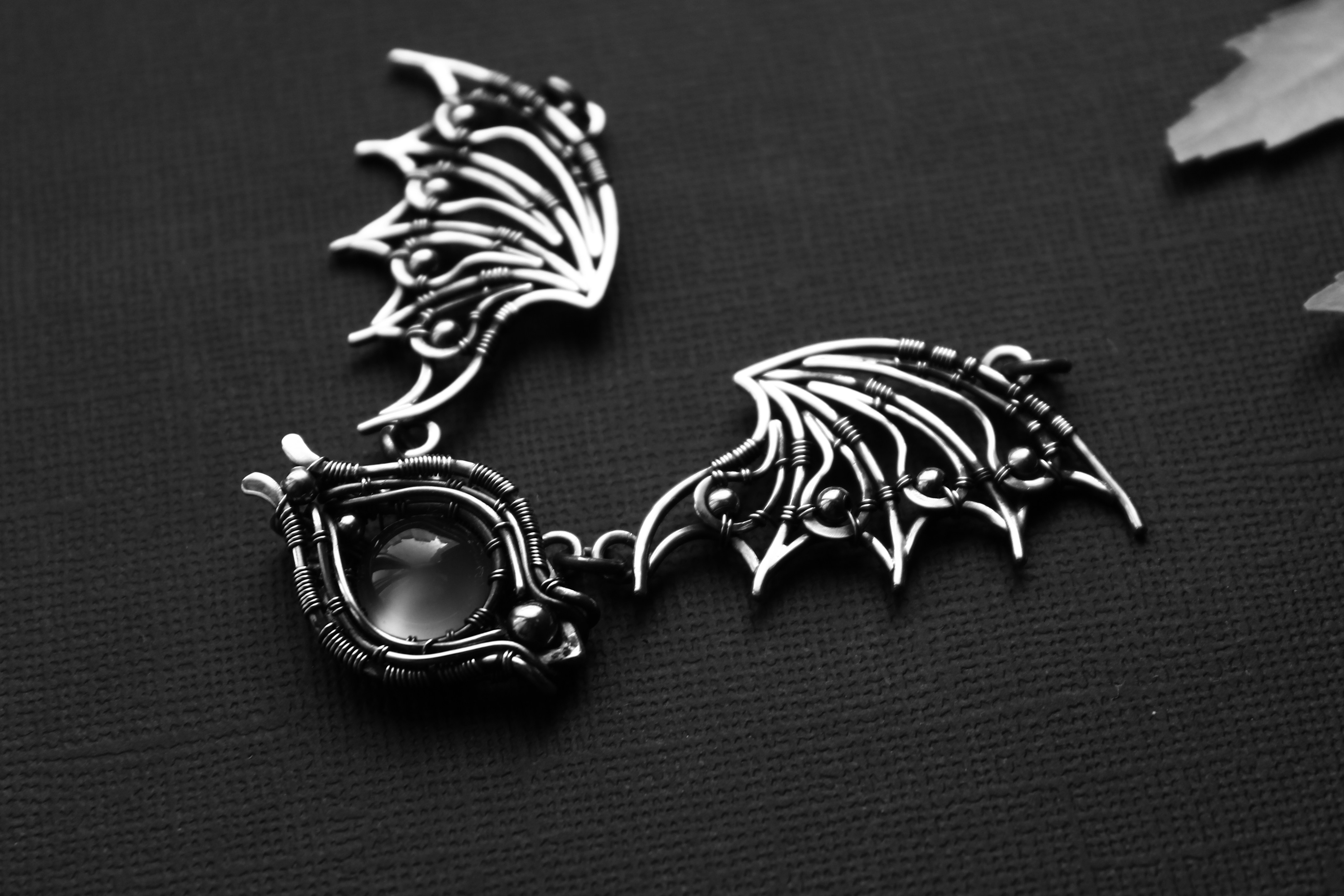 Silent Wings Guard a Moonlit Locket