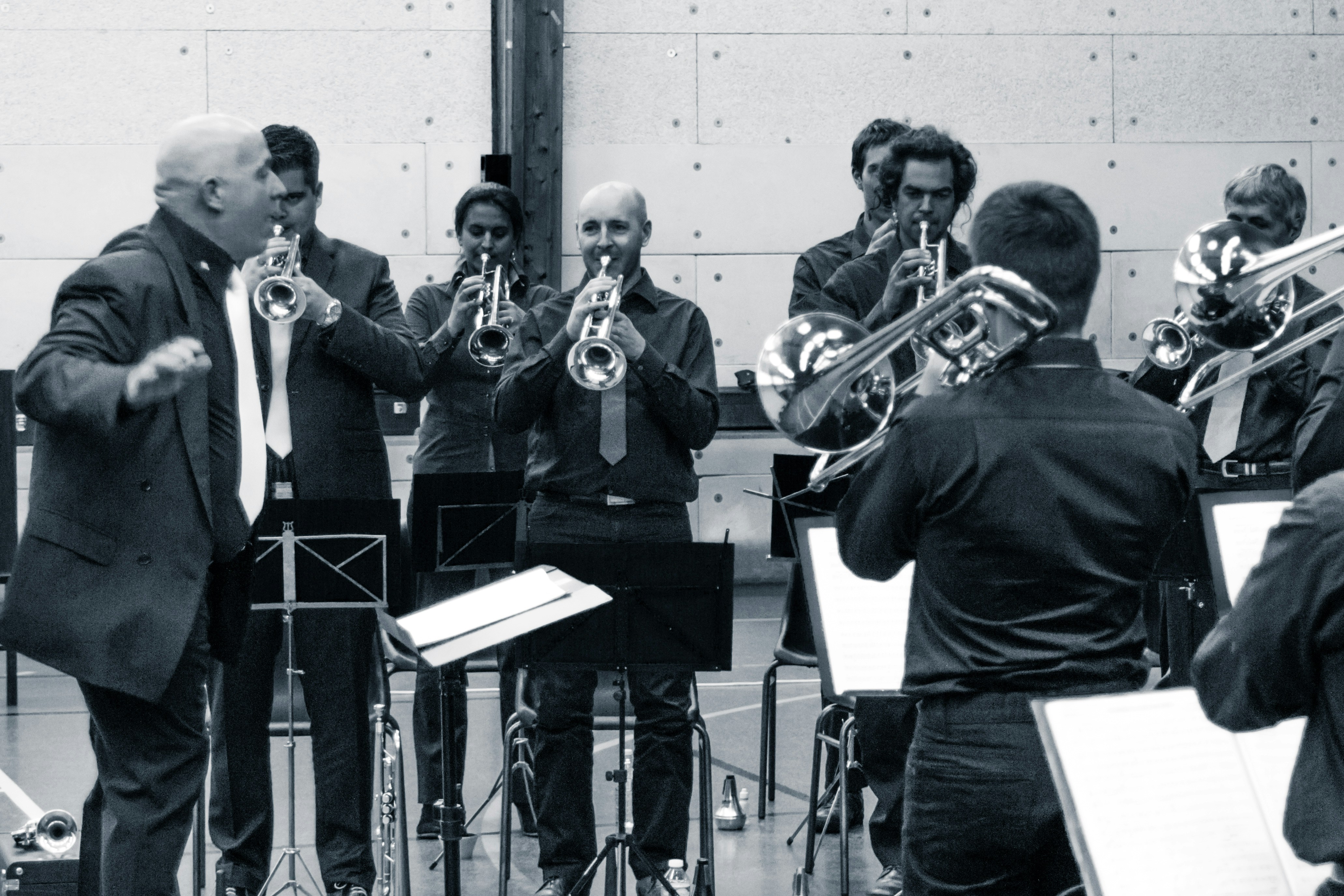 A group of men in suits and ties playing musical instruments photo ...