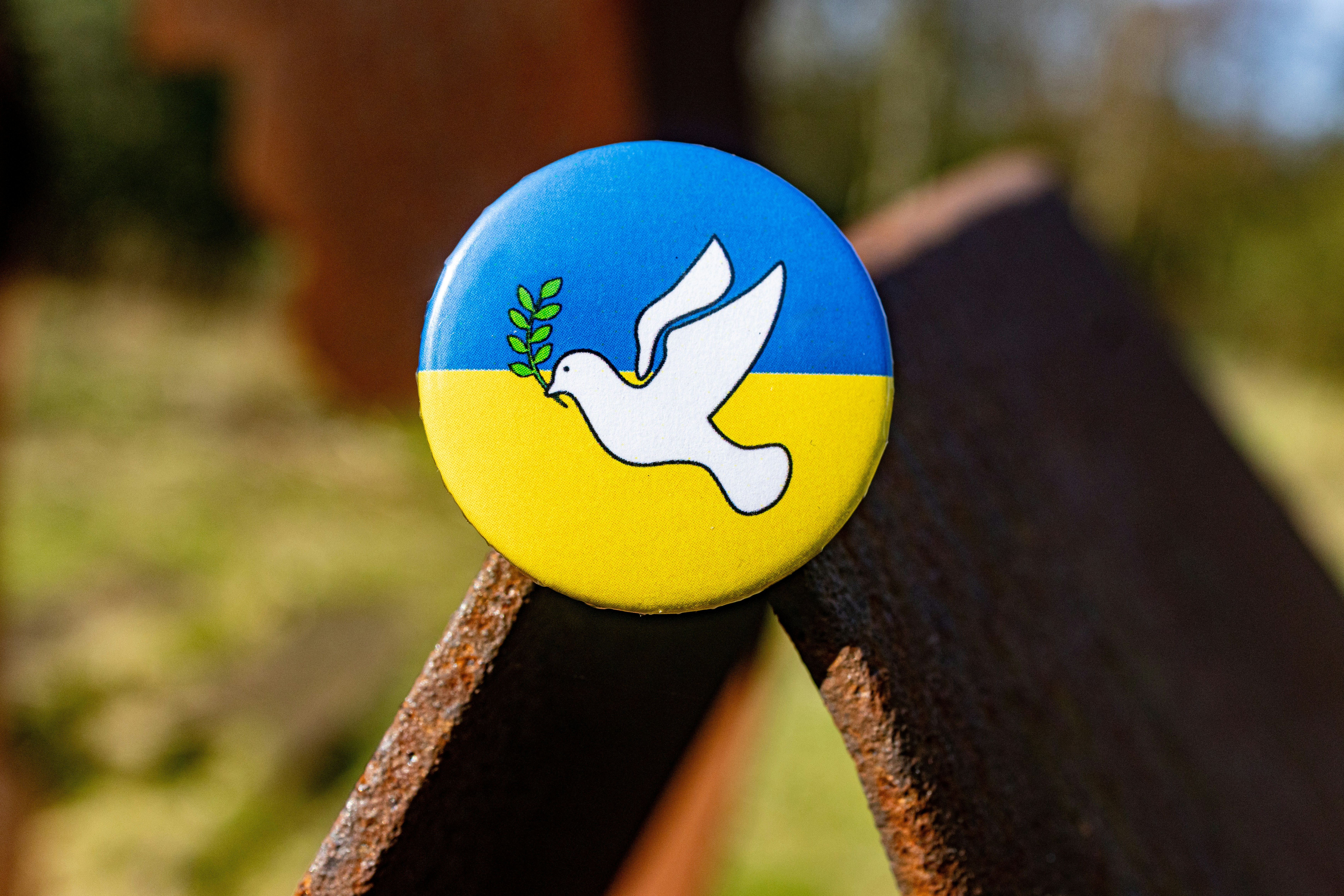 Dove Emblem on a Weathered Iron Beam