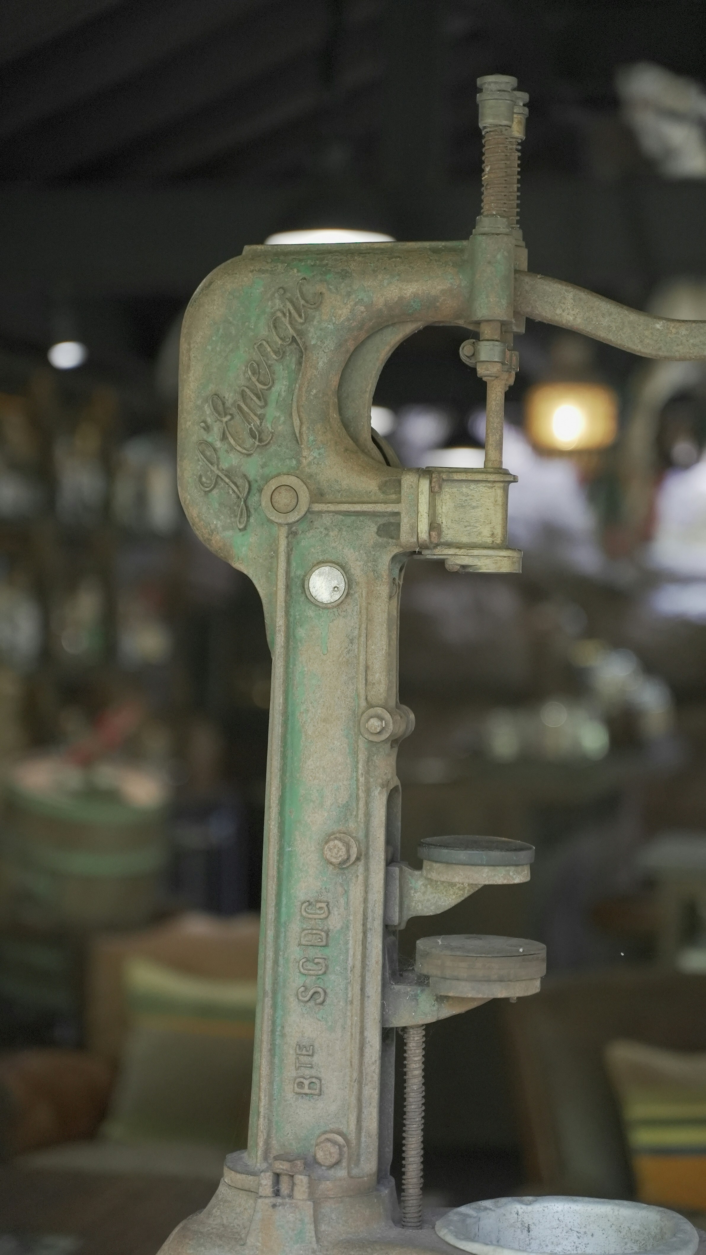 The Rusted Ancestor: A Vintage Press Anchoring a Quiet Workshop