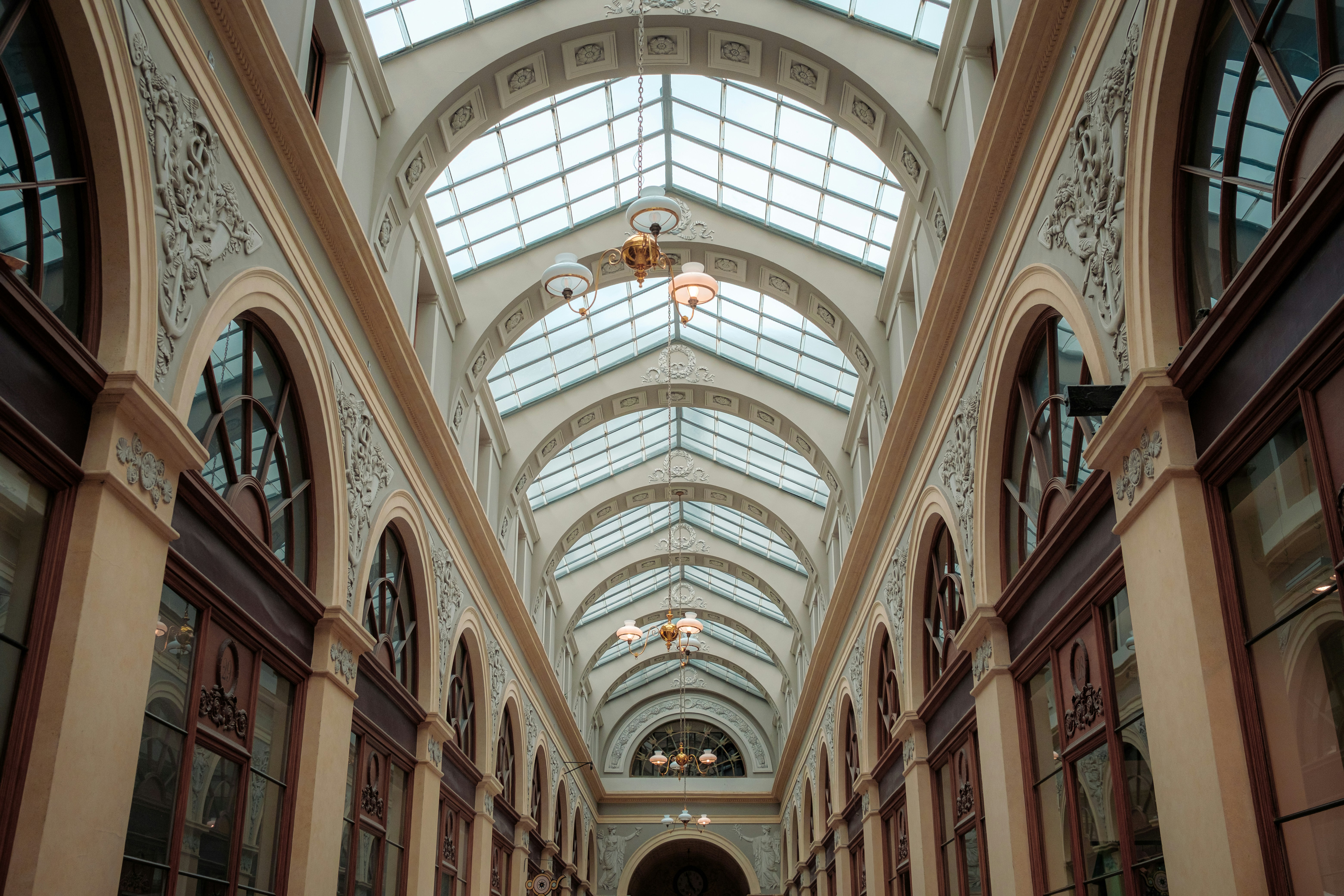 A long hallway with a skylight above it photo – Free Grey Image on Unsplash