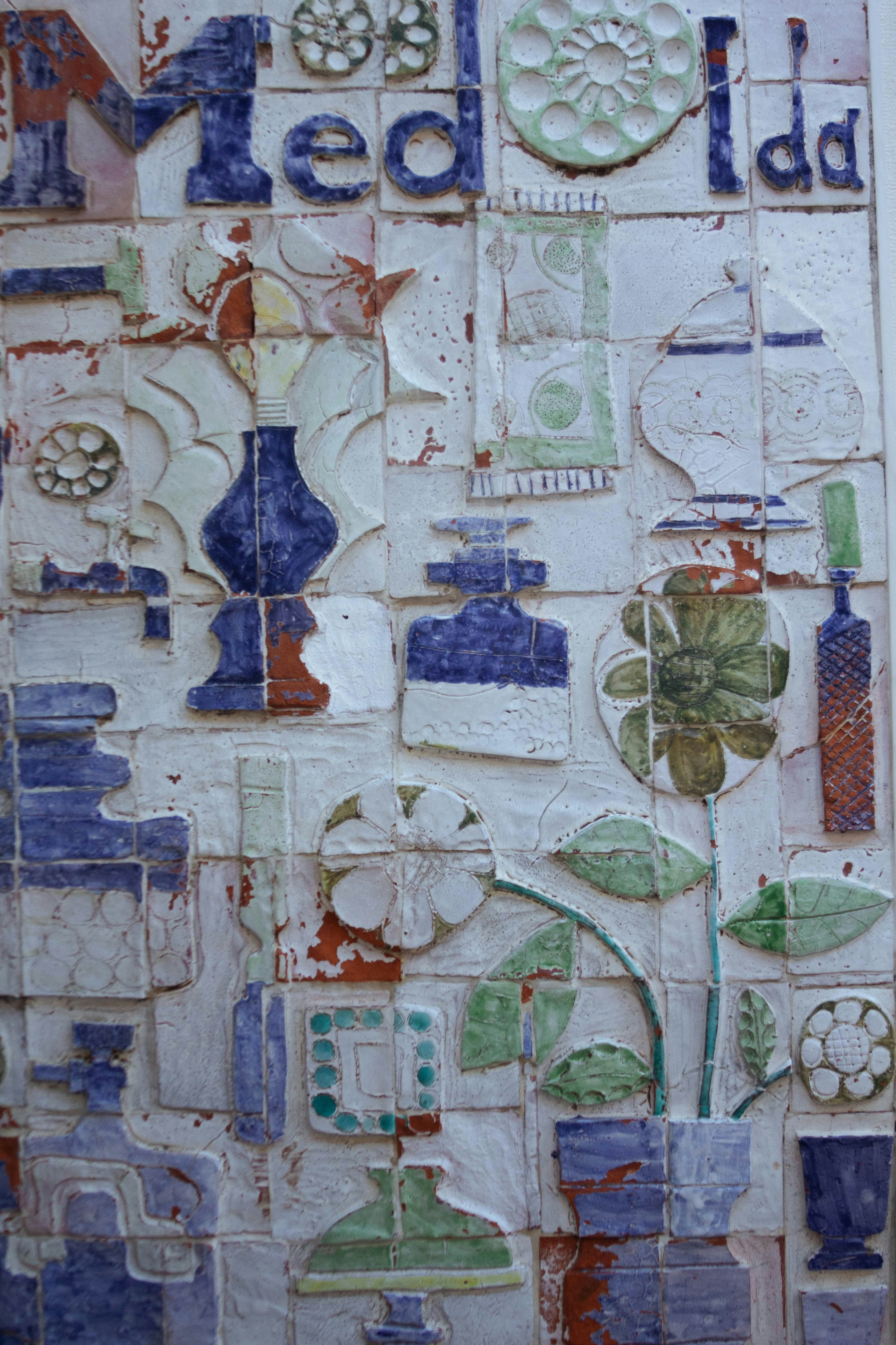 Blue Vases and Verdant Leaves: A Geometric Tile Mosaic