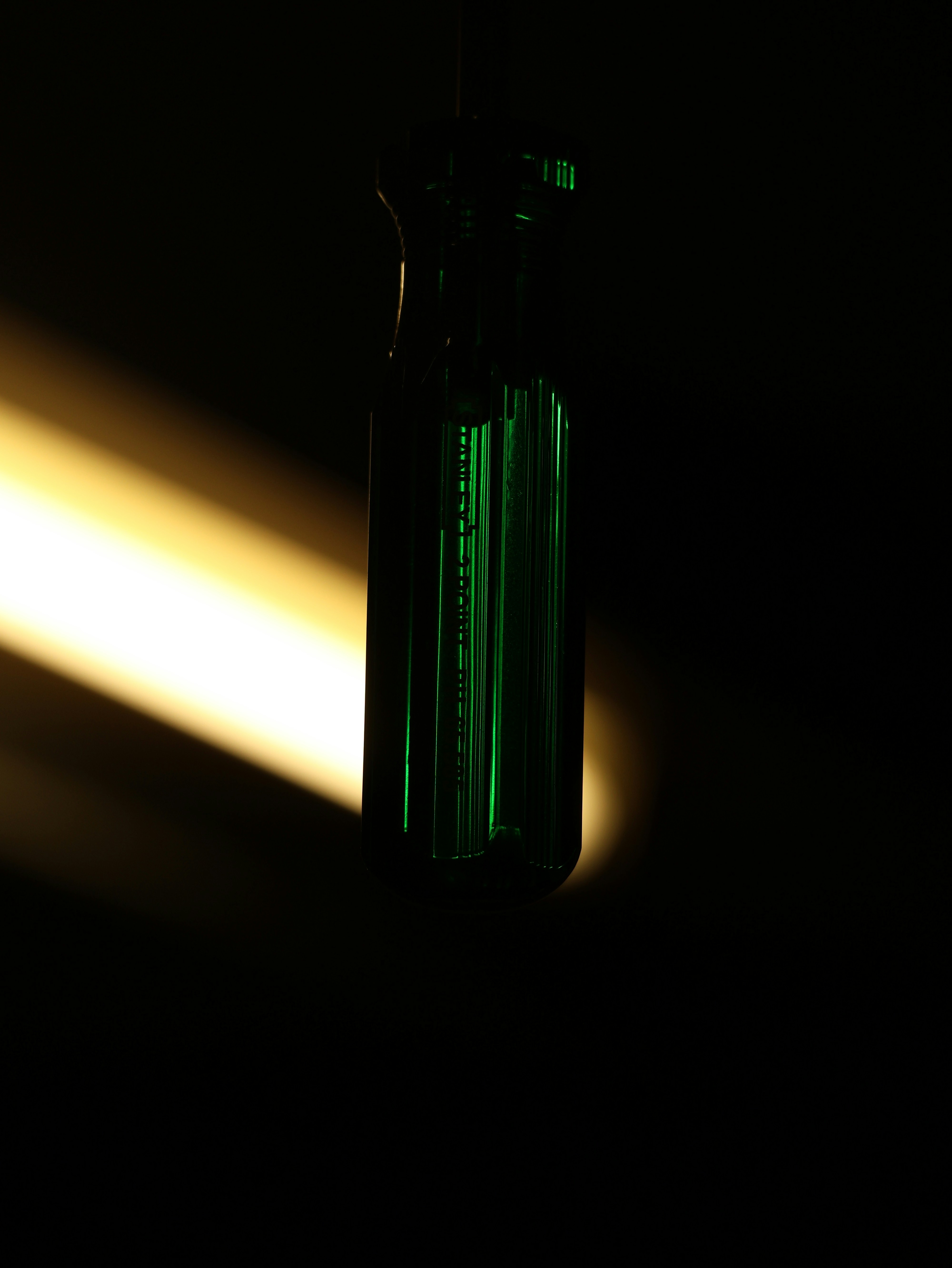 Emerald Prism in a Midnight Glow
