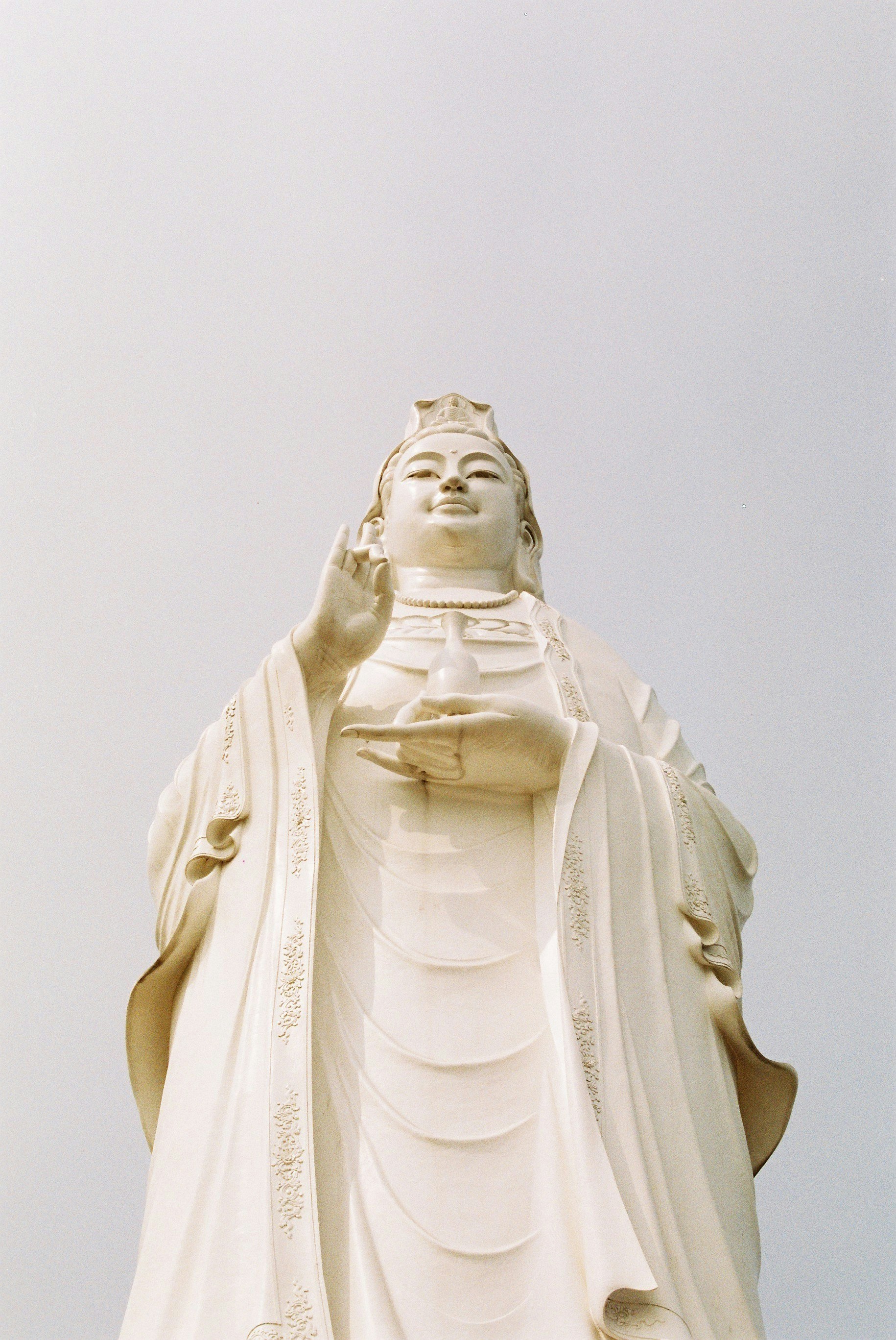 A statue of a person holding a tray of food photo – Free Da nang Image ...